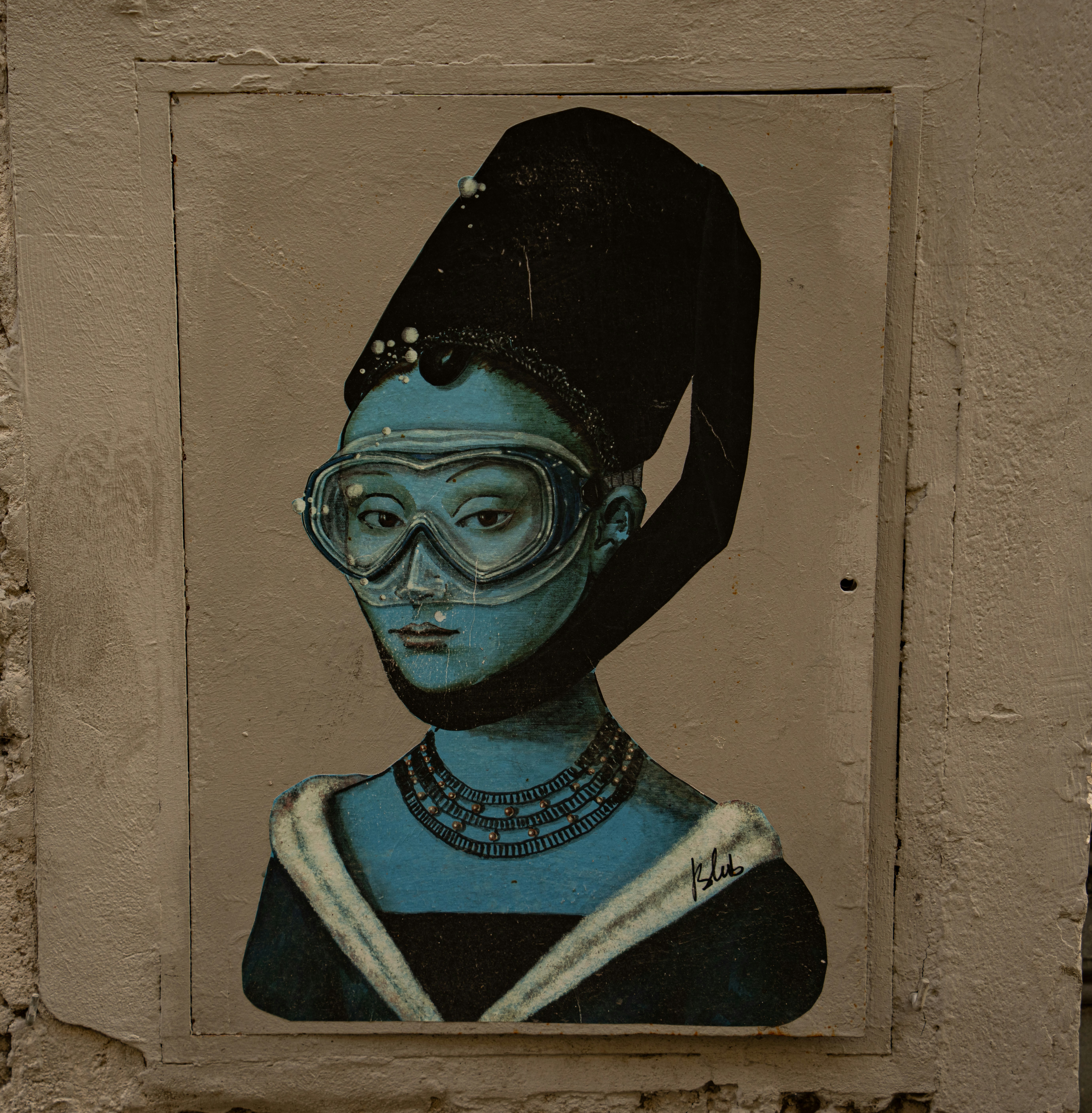 Diving Glasses and Blue Veil: Street Portrait in Gloom