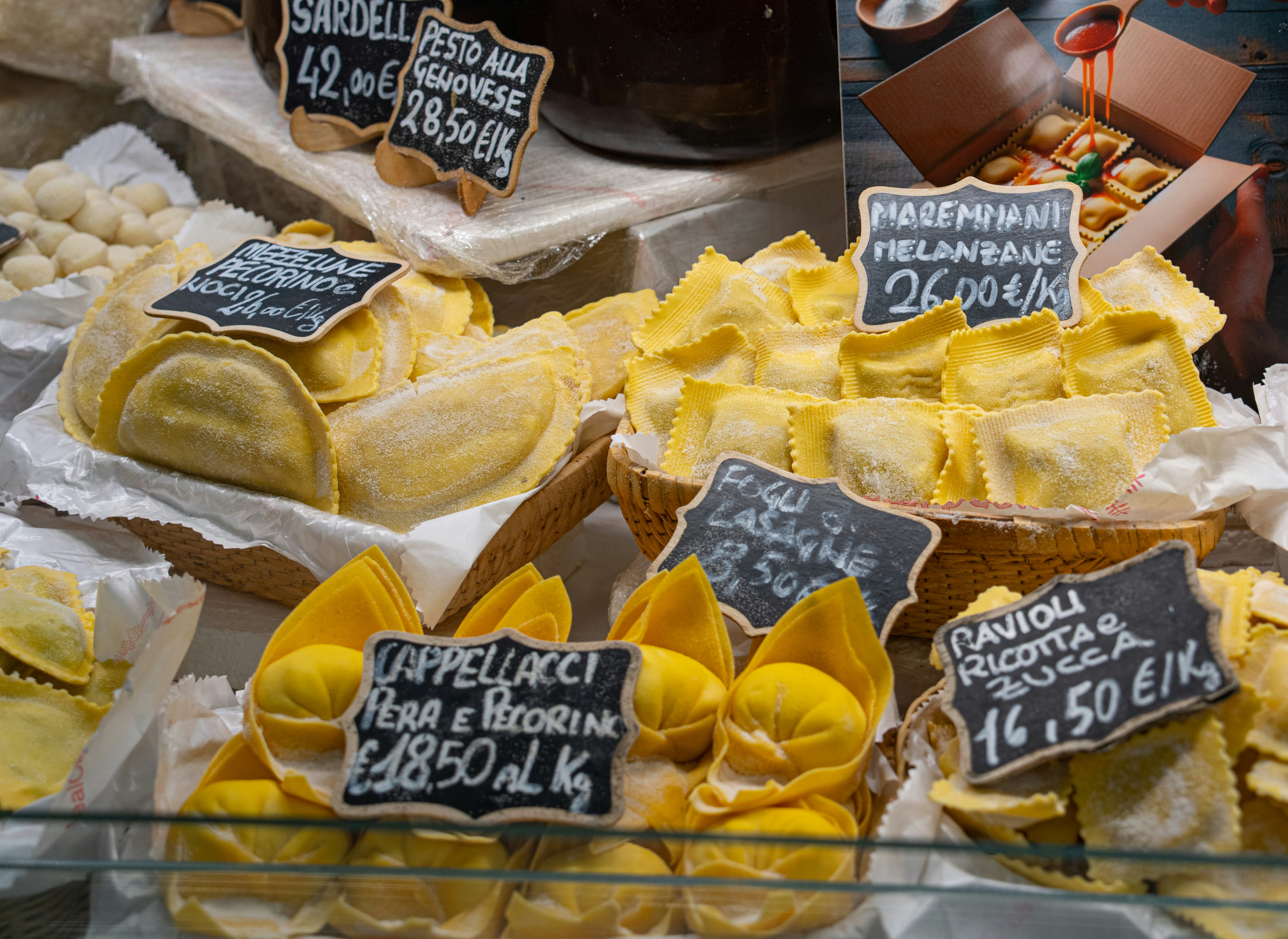 Sunlit Wheels of Italy: A Cheese Counter Close-Up