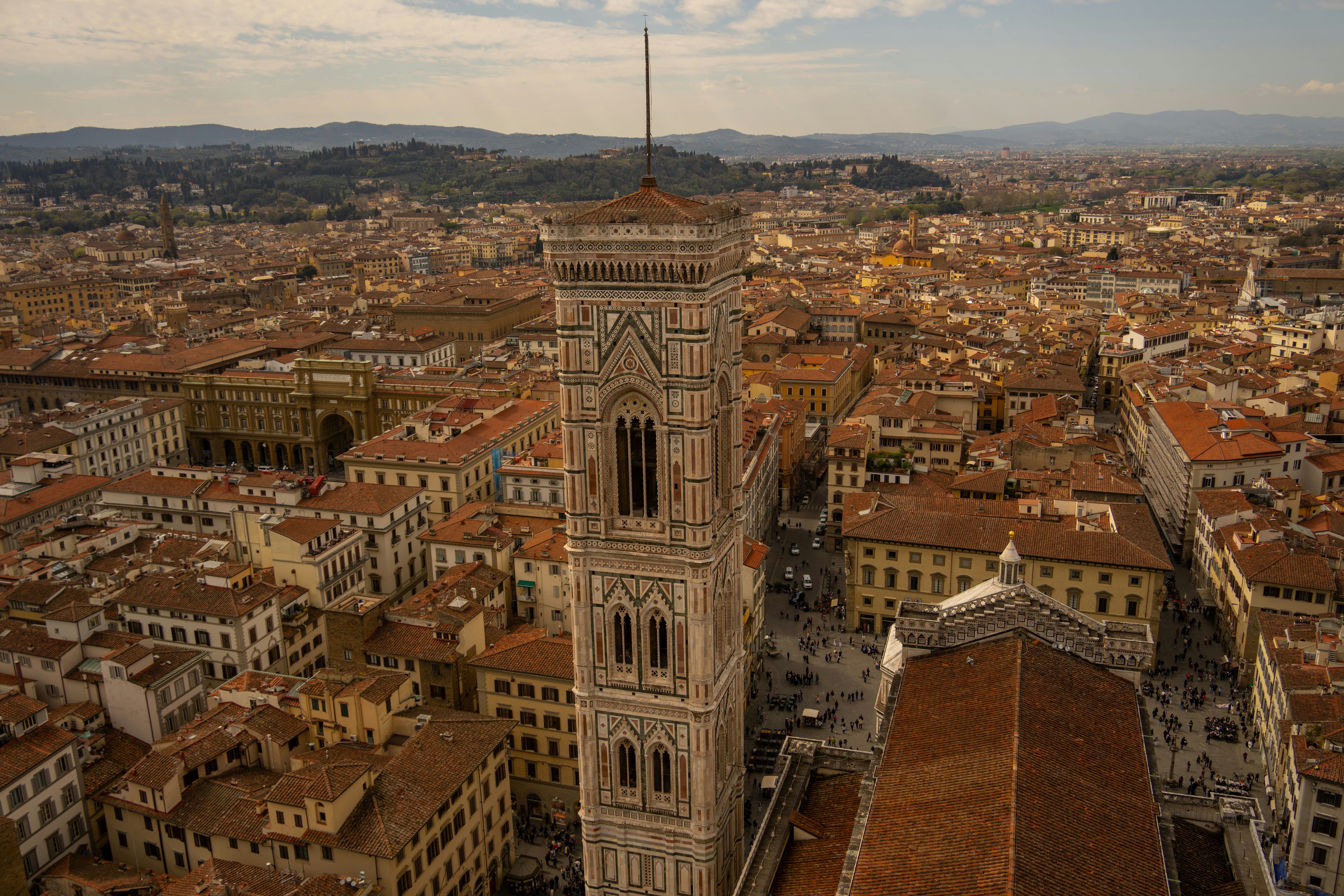 Towering Vision: Giotto’s Campanile Rising Above Florence’s Roofscape