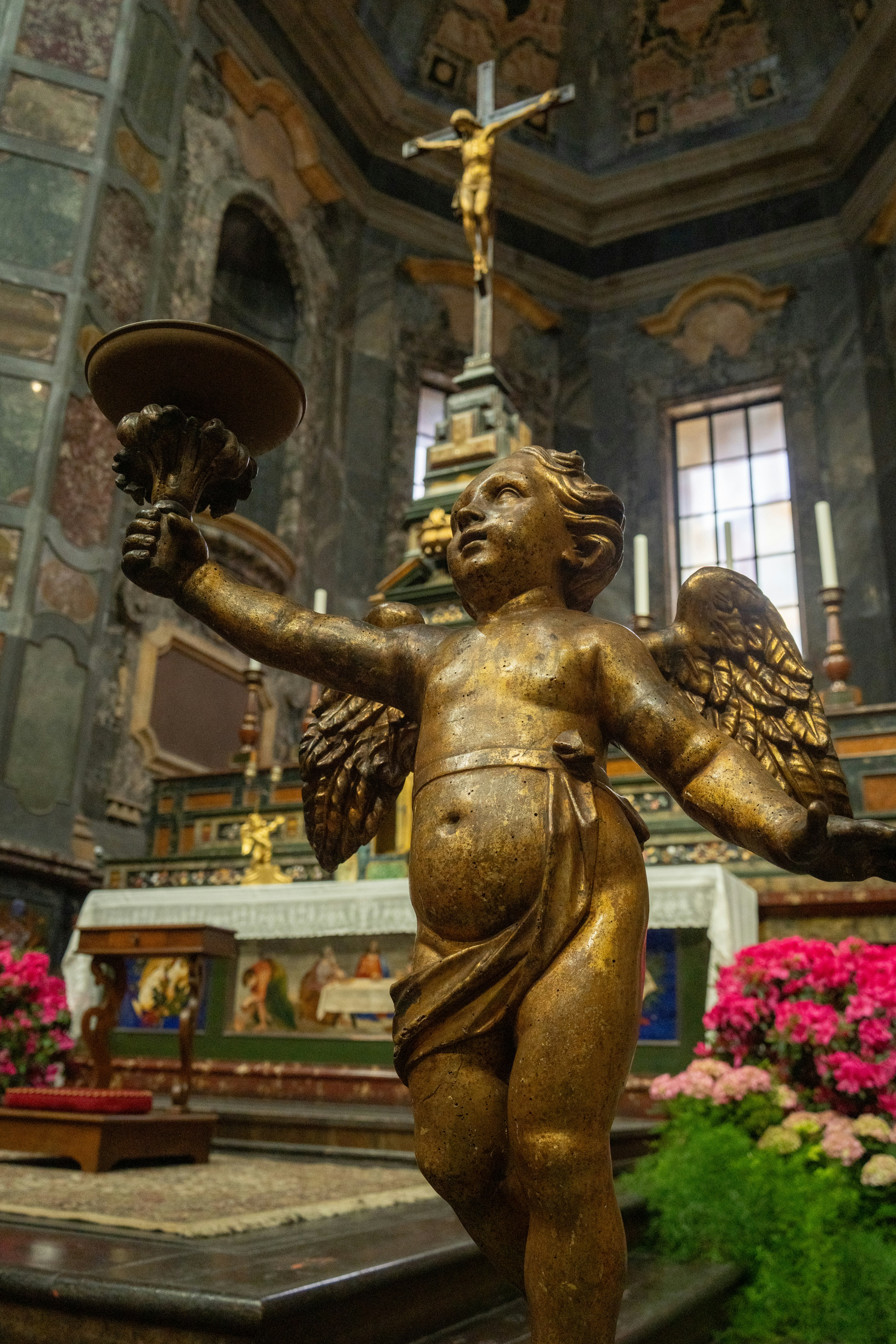 Winged Cherub in a Marble Cathedral