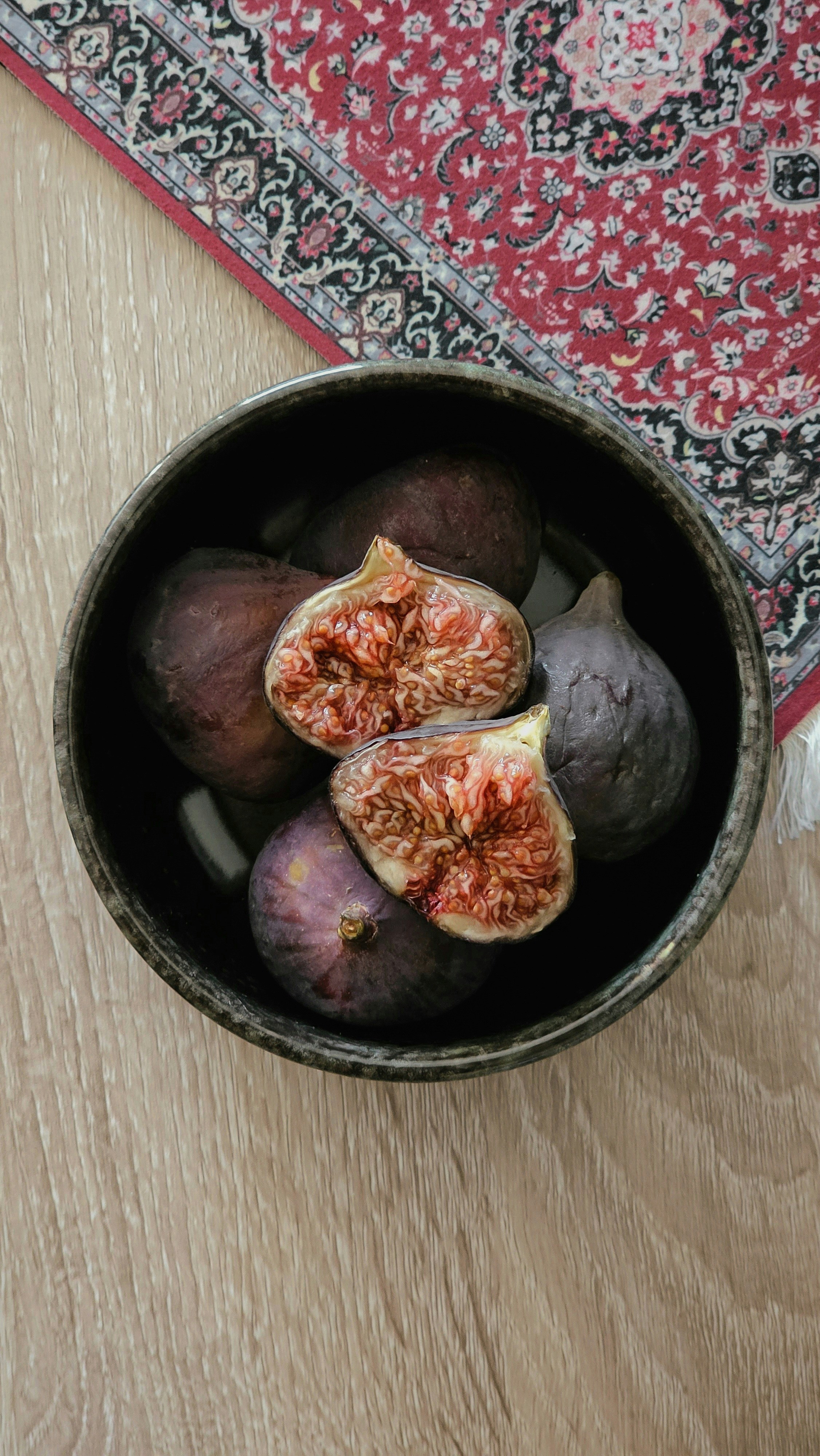 Fruit of Stillness: Fig Halves Resting in a Ceramic Bowl