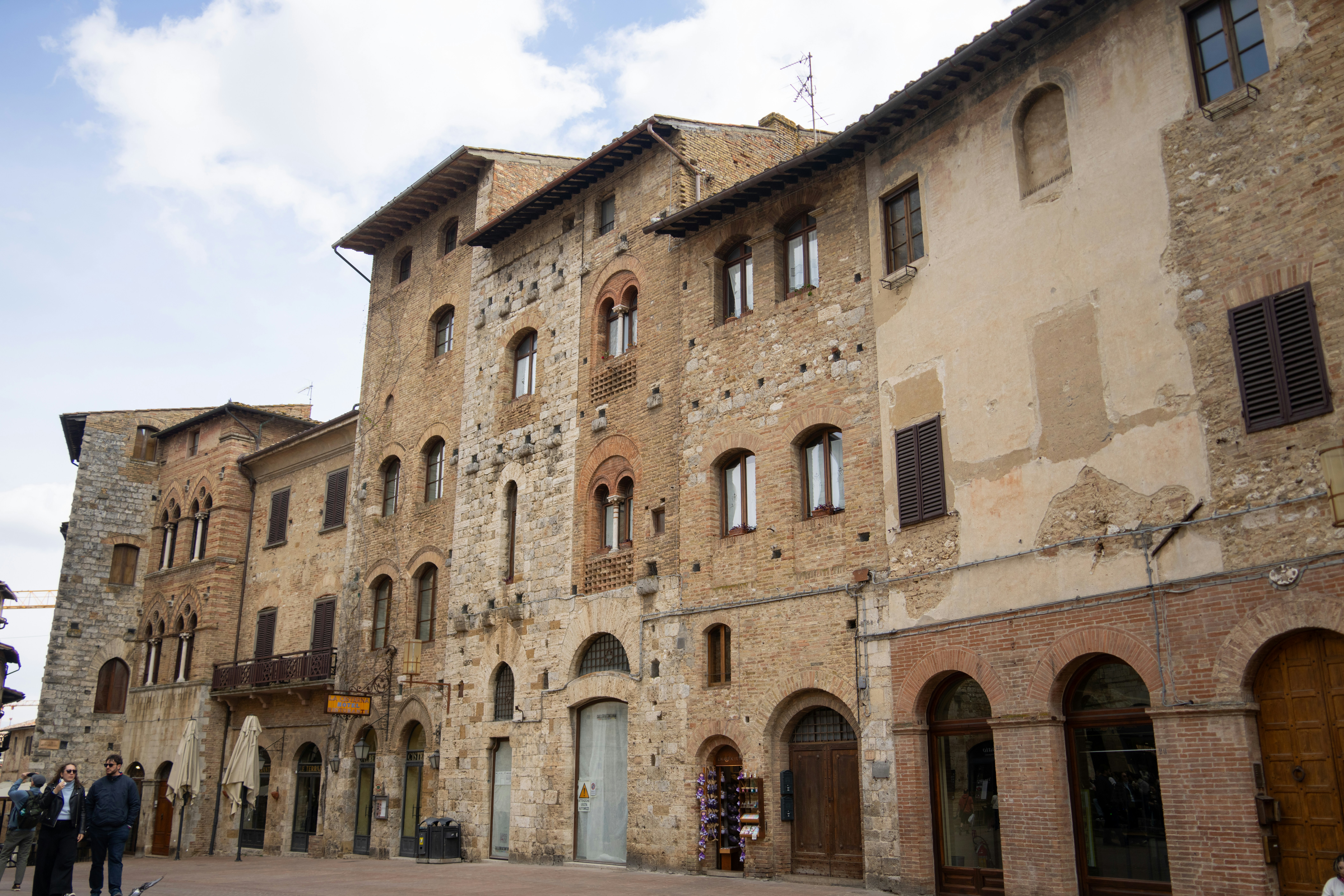 Ancient Facade of a Sunlit Tuscan-Stone Street