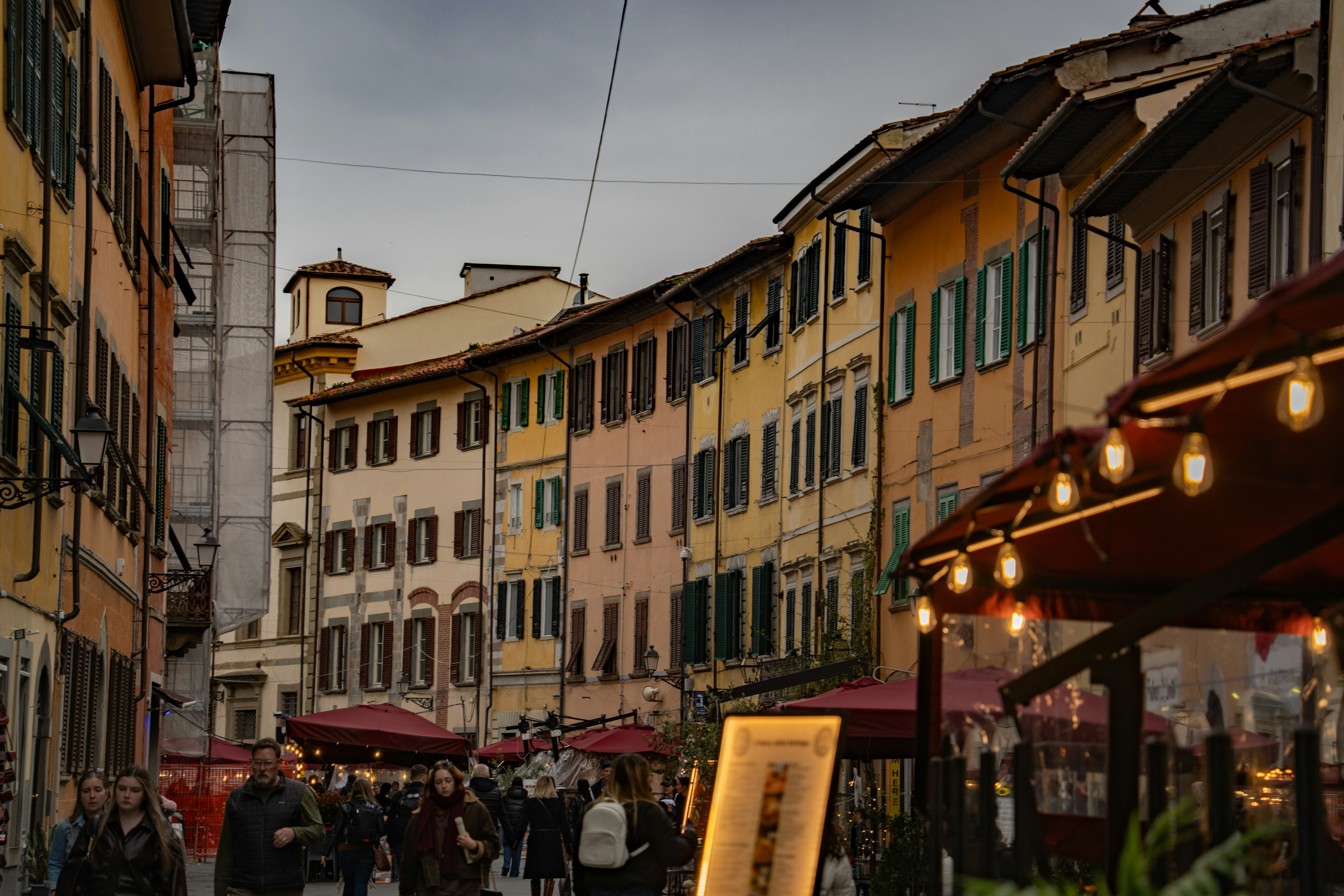 Cobbled Piazza Speckled with Golden Evening Lights