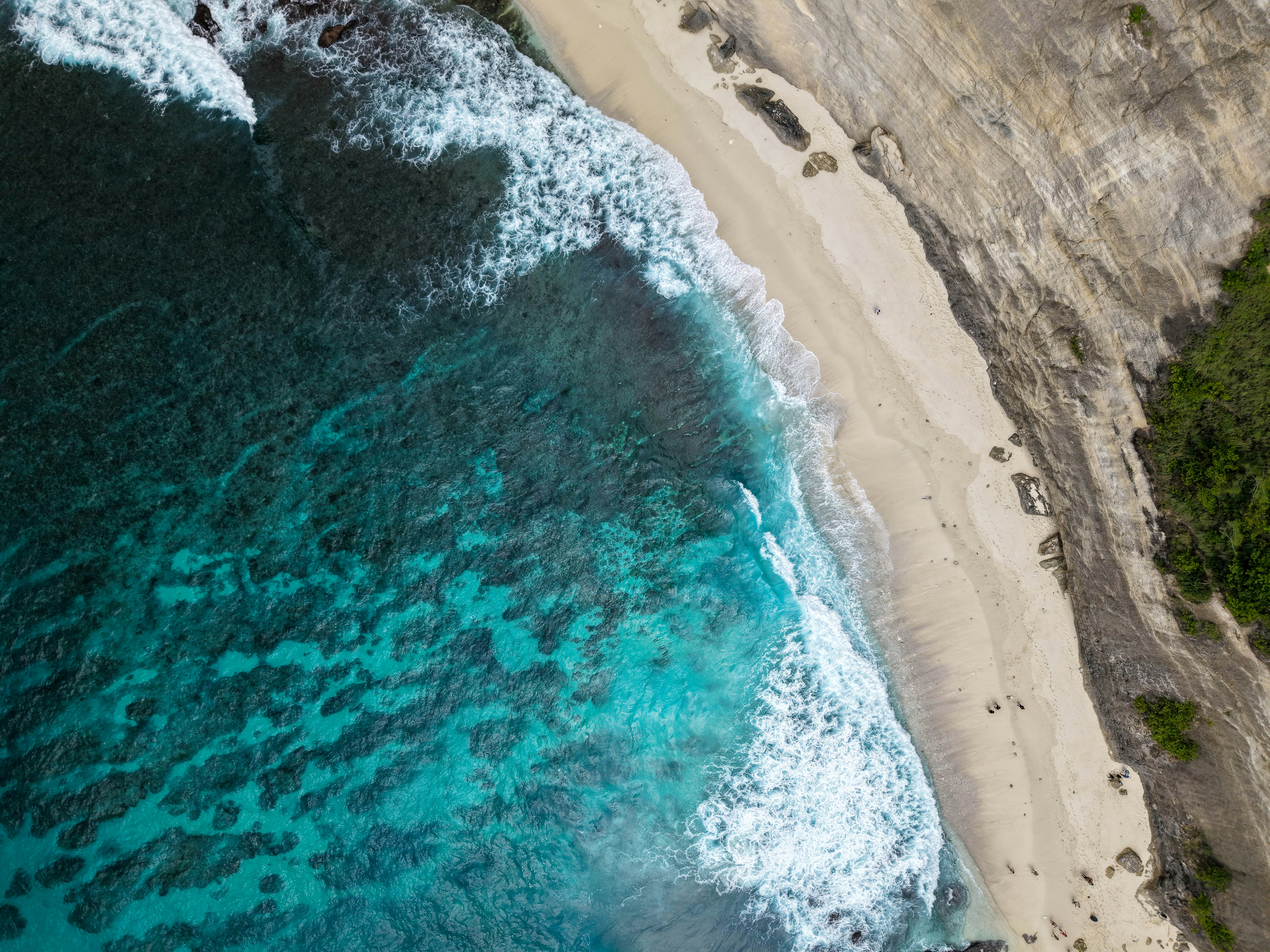 Azure Crest: Coastal Cliffline Meeting Turquoise Sea