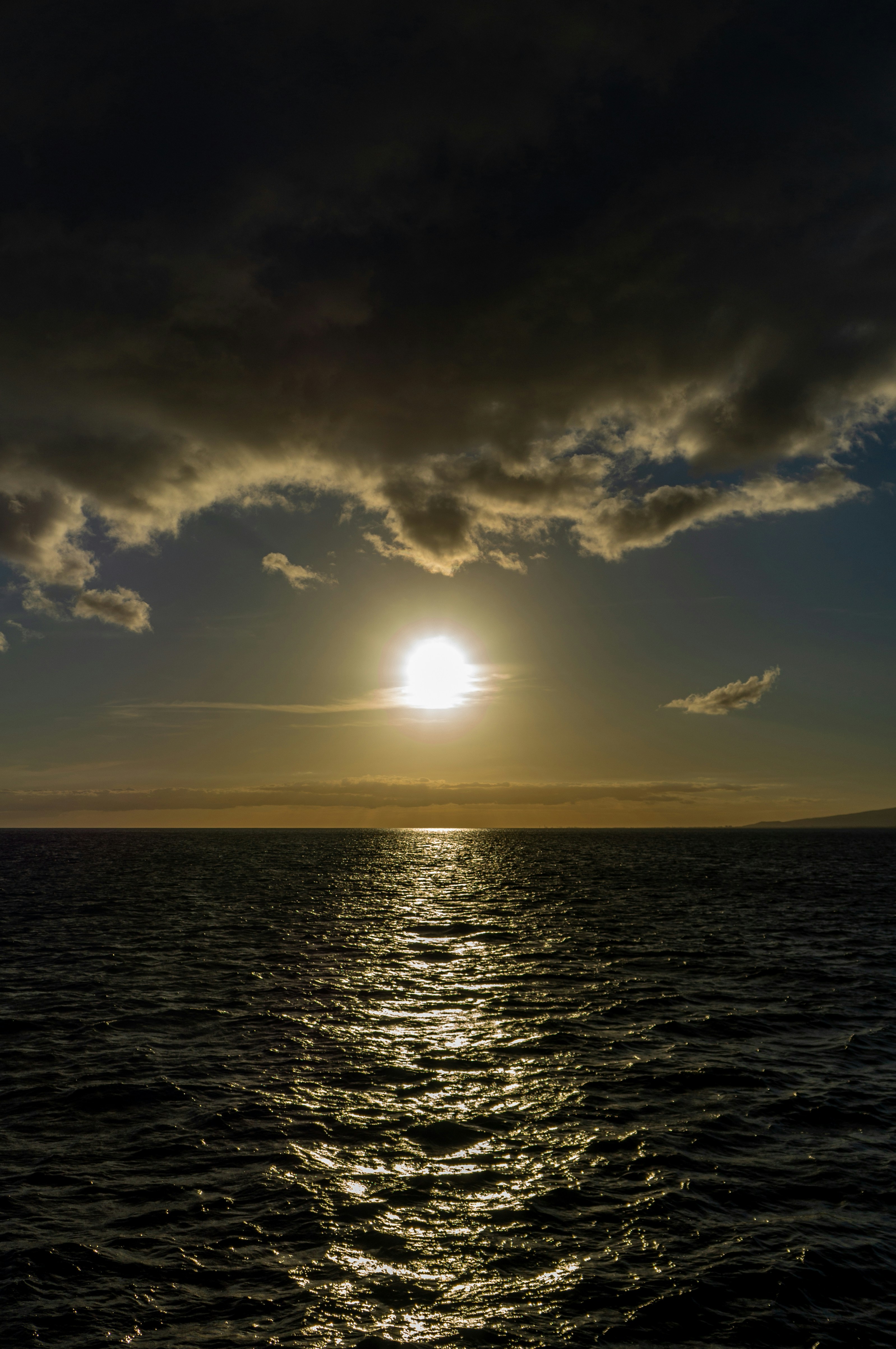 Sunlit Path Across a Calm Horizon