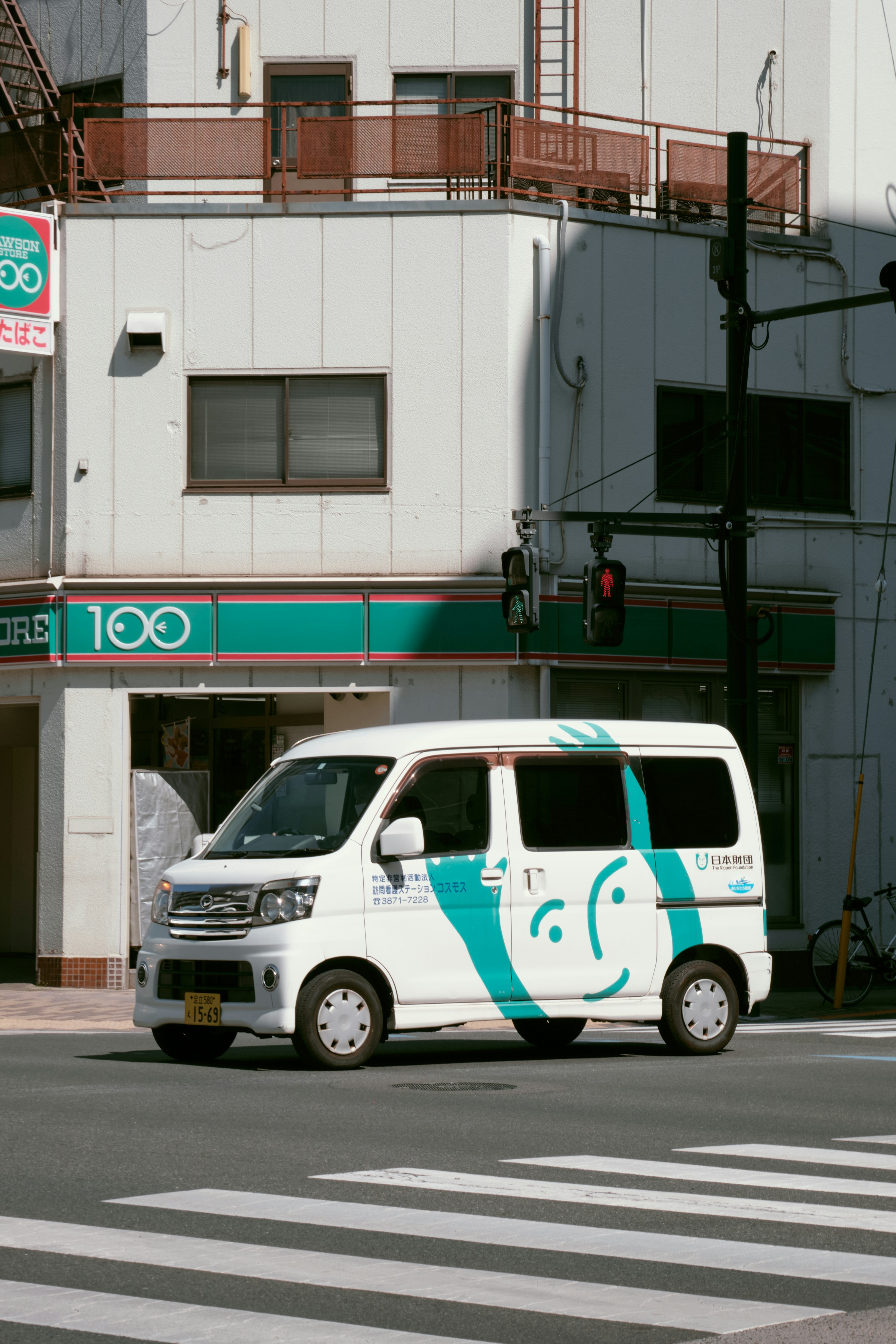 Urban Delivery: A Whisper of Color by the 100 Sign