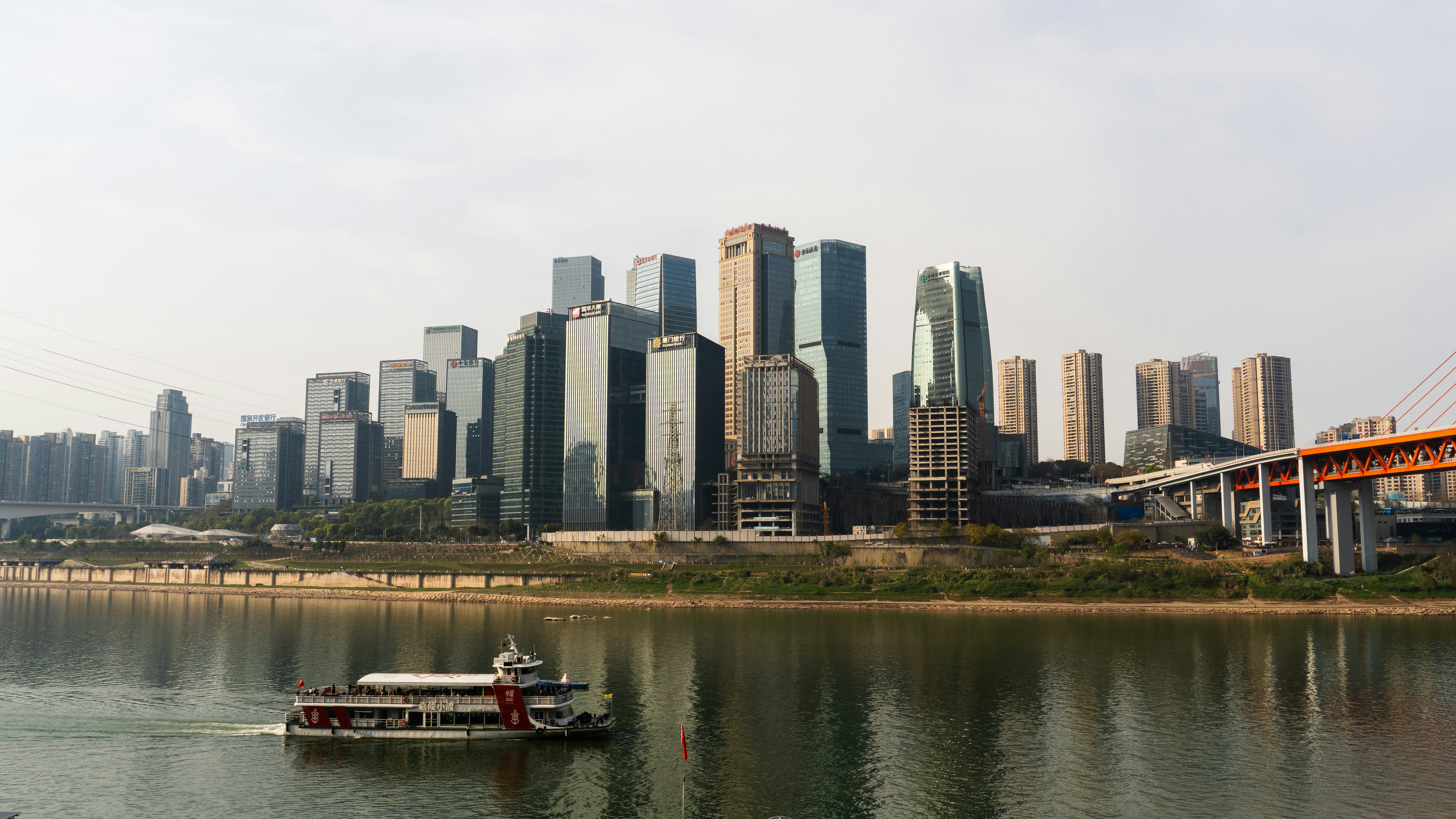 City of Glass: Riverfront Skyscrapers at Dusk