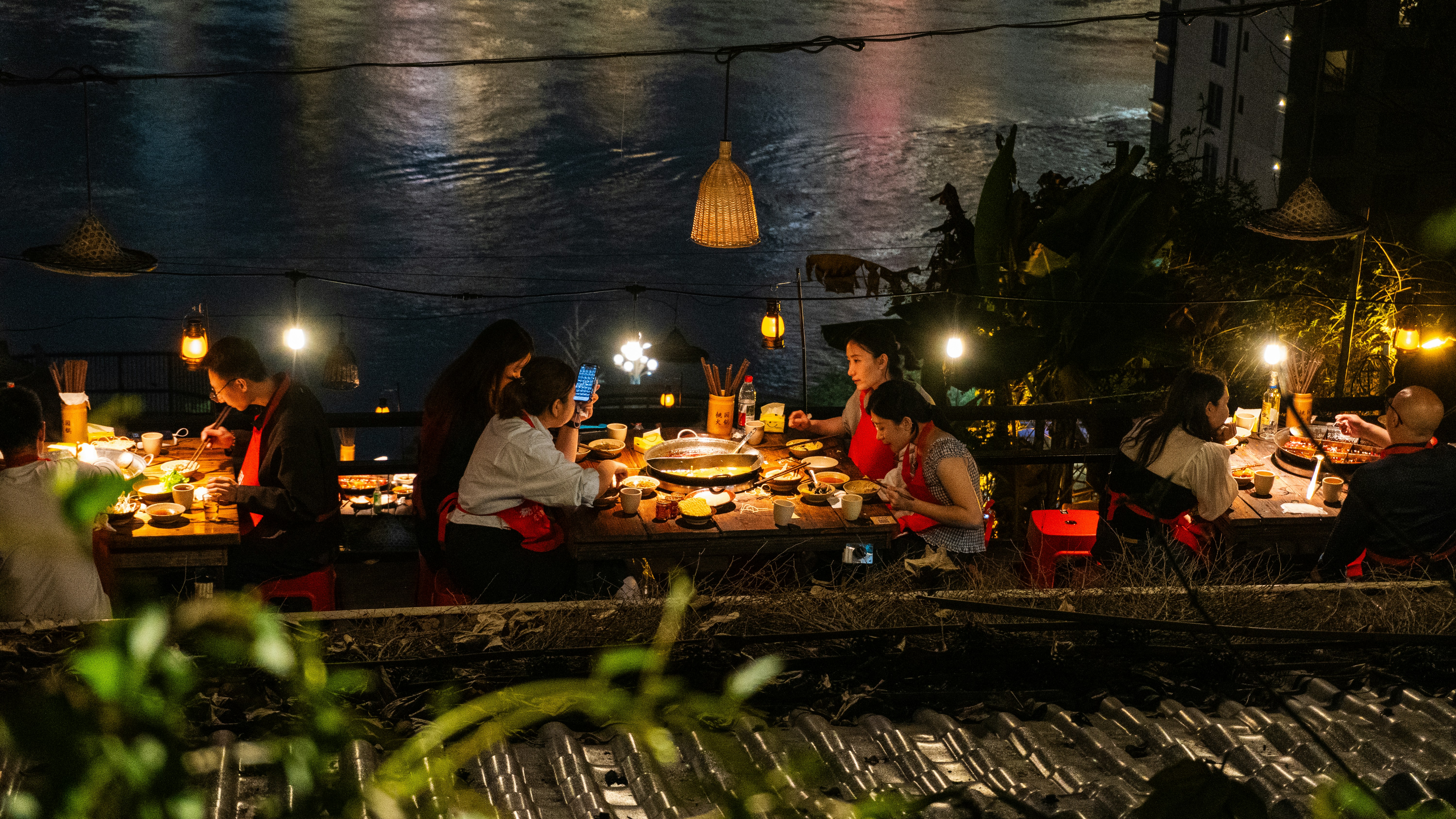 Lantern-lit Riverside Dinner Under City Lights