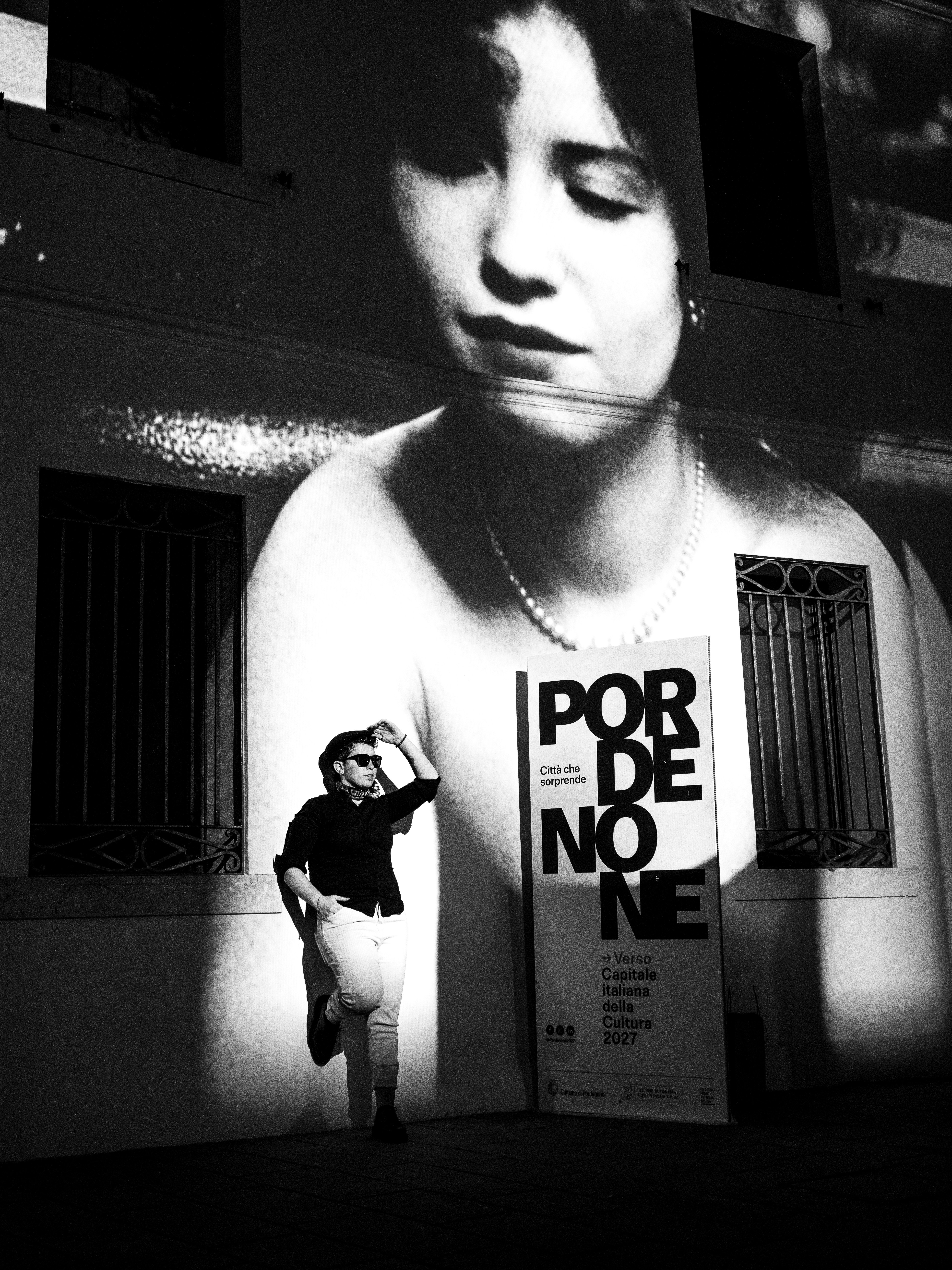 Shadowed Stance by the Poster Banner