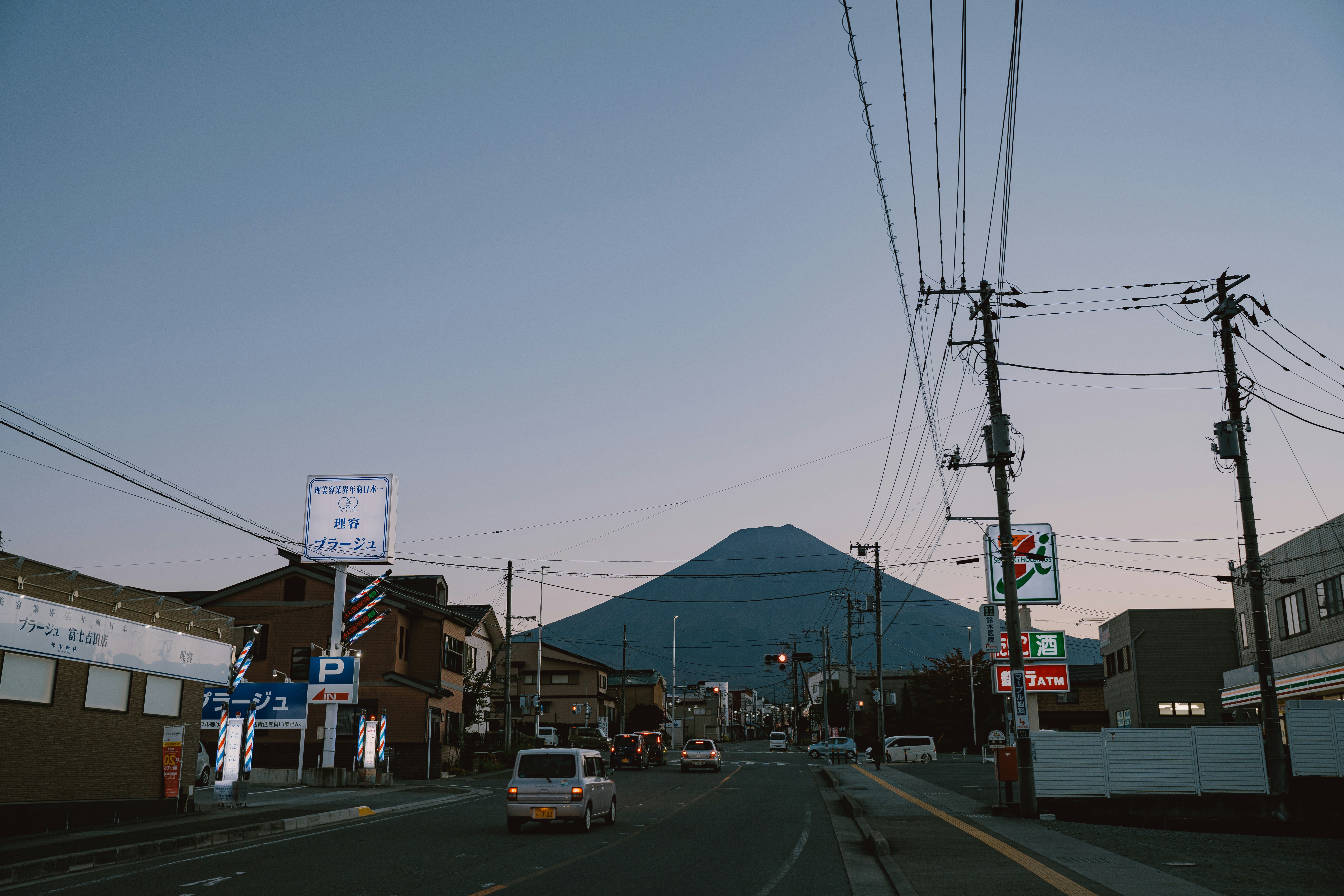 Quiet Town Road Toward the Cone-Shaped Mountain