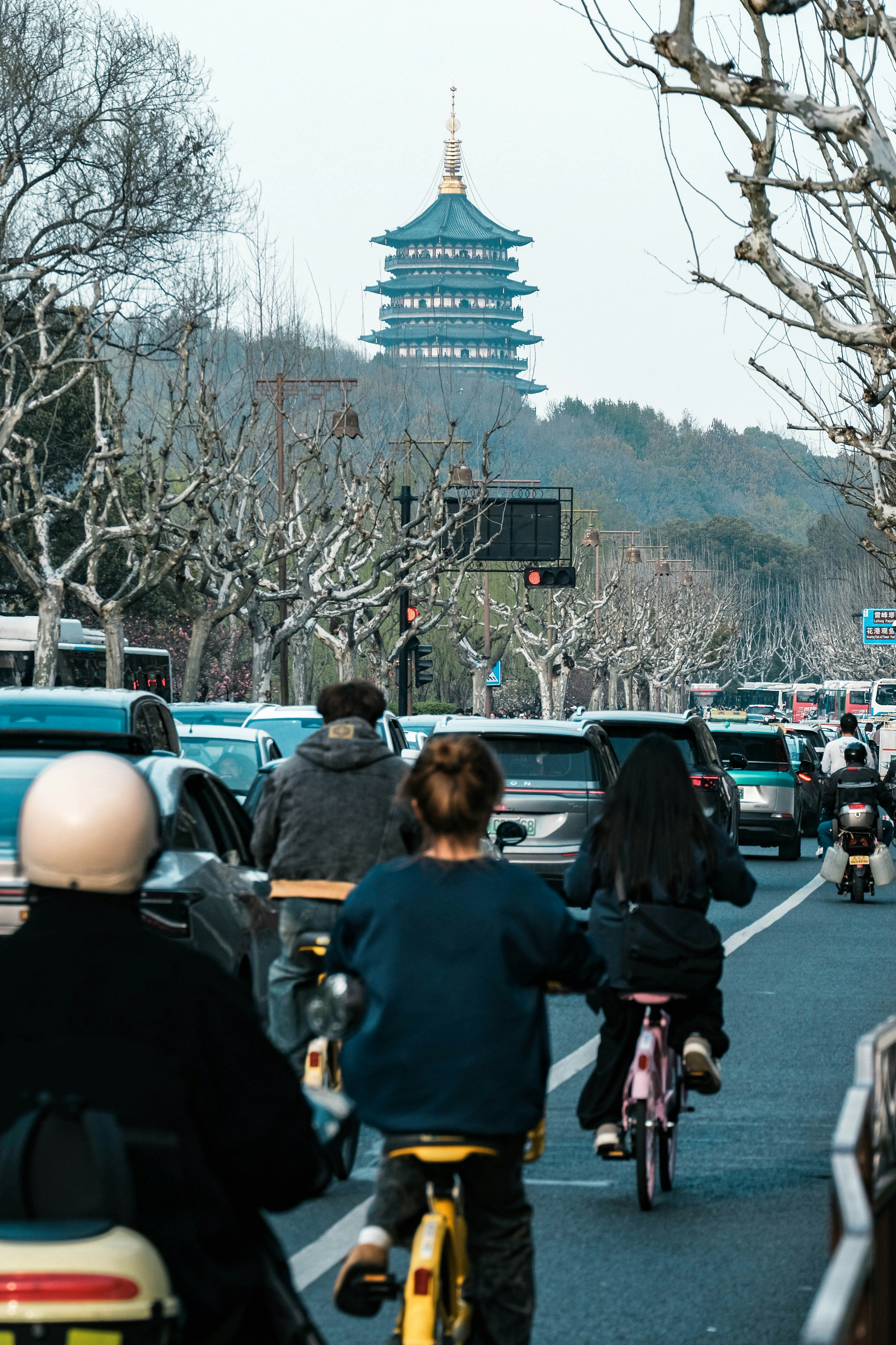 Traffic Cascade toward a Pagoda: City Street Meets Historic Tower