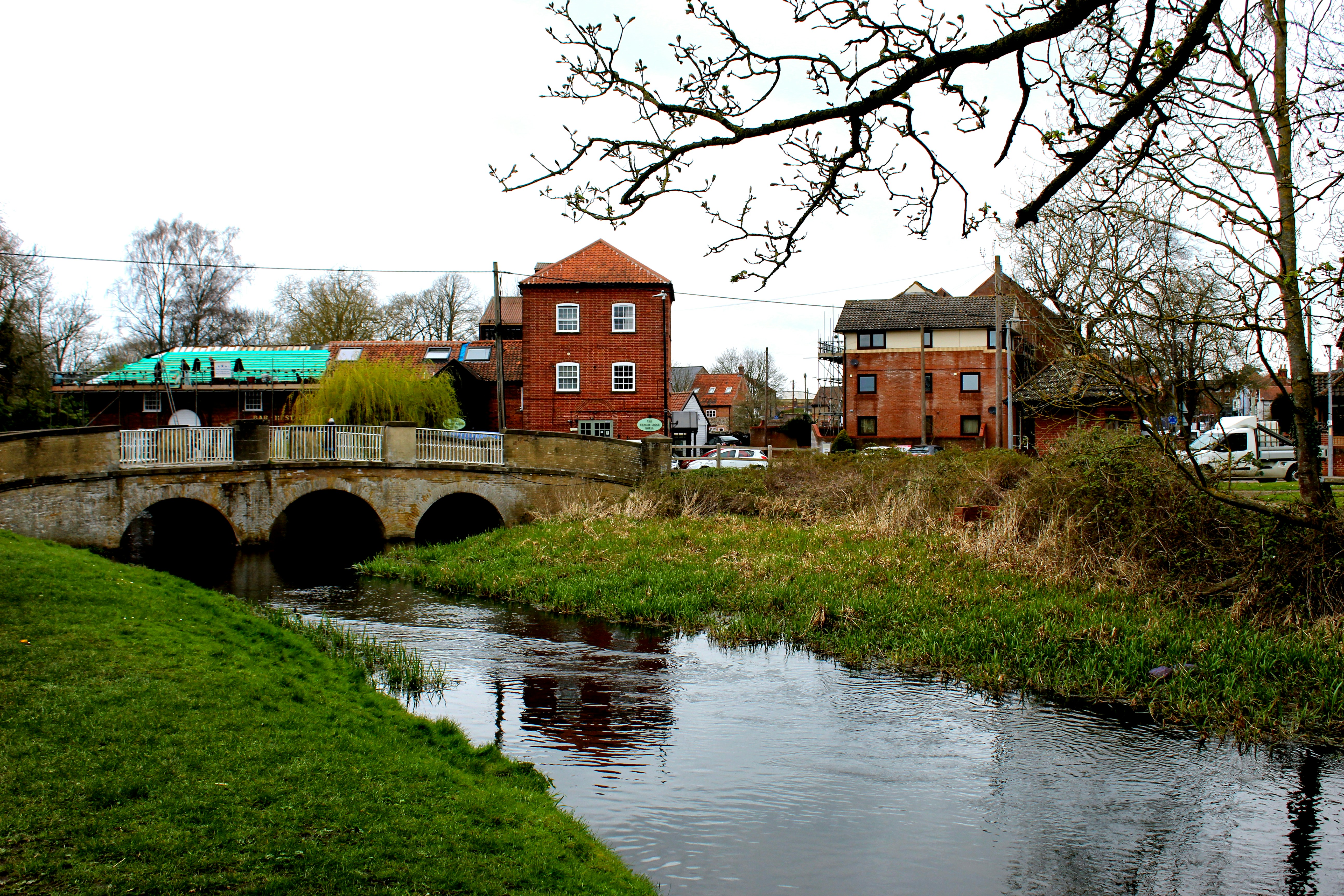 Brick Bridge over a Quiet River: A Small Town Vista
