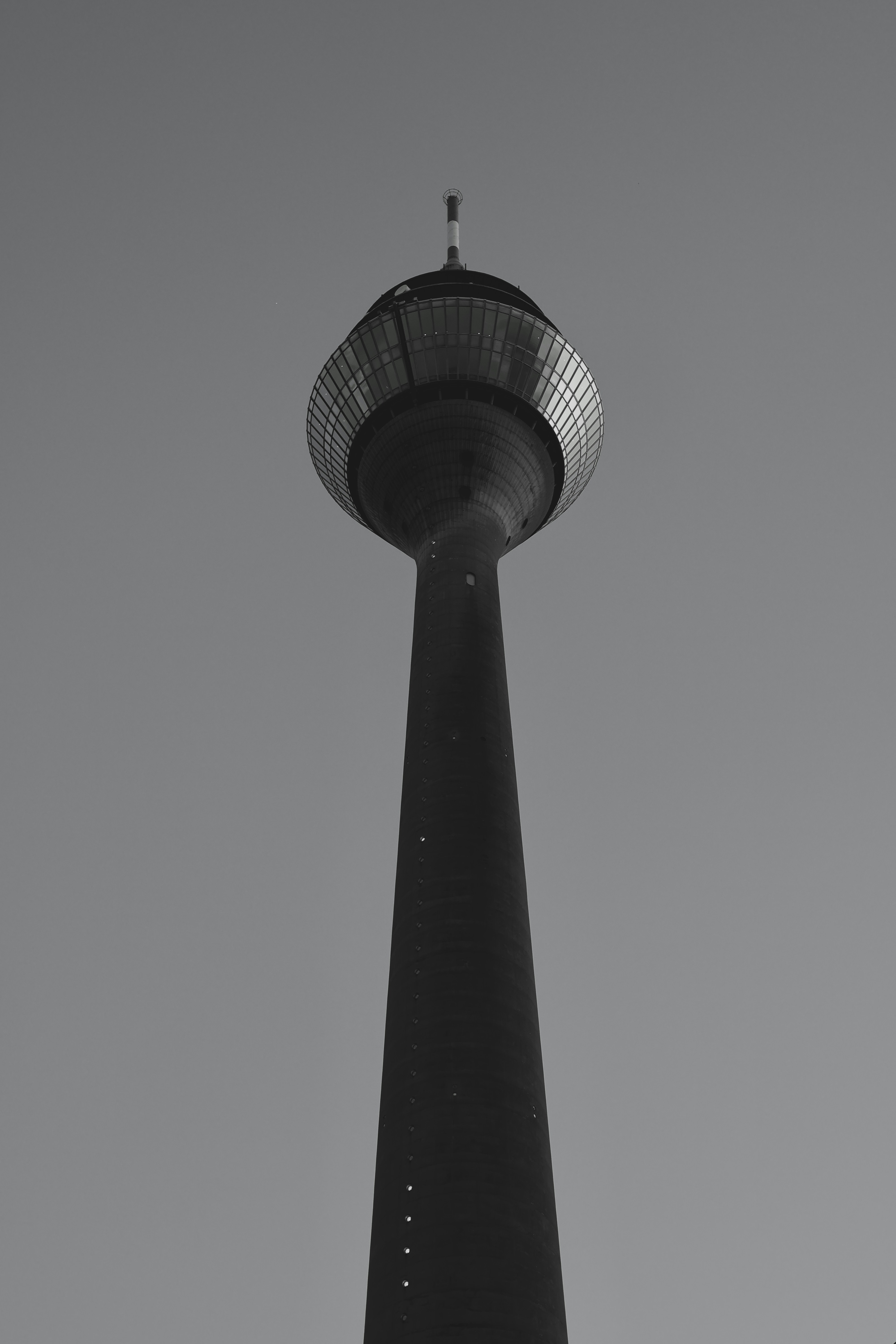 The Sentinel Cone: A Gravity-Defying Watchtower Soaring Against Sky