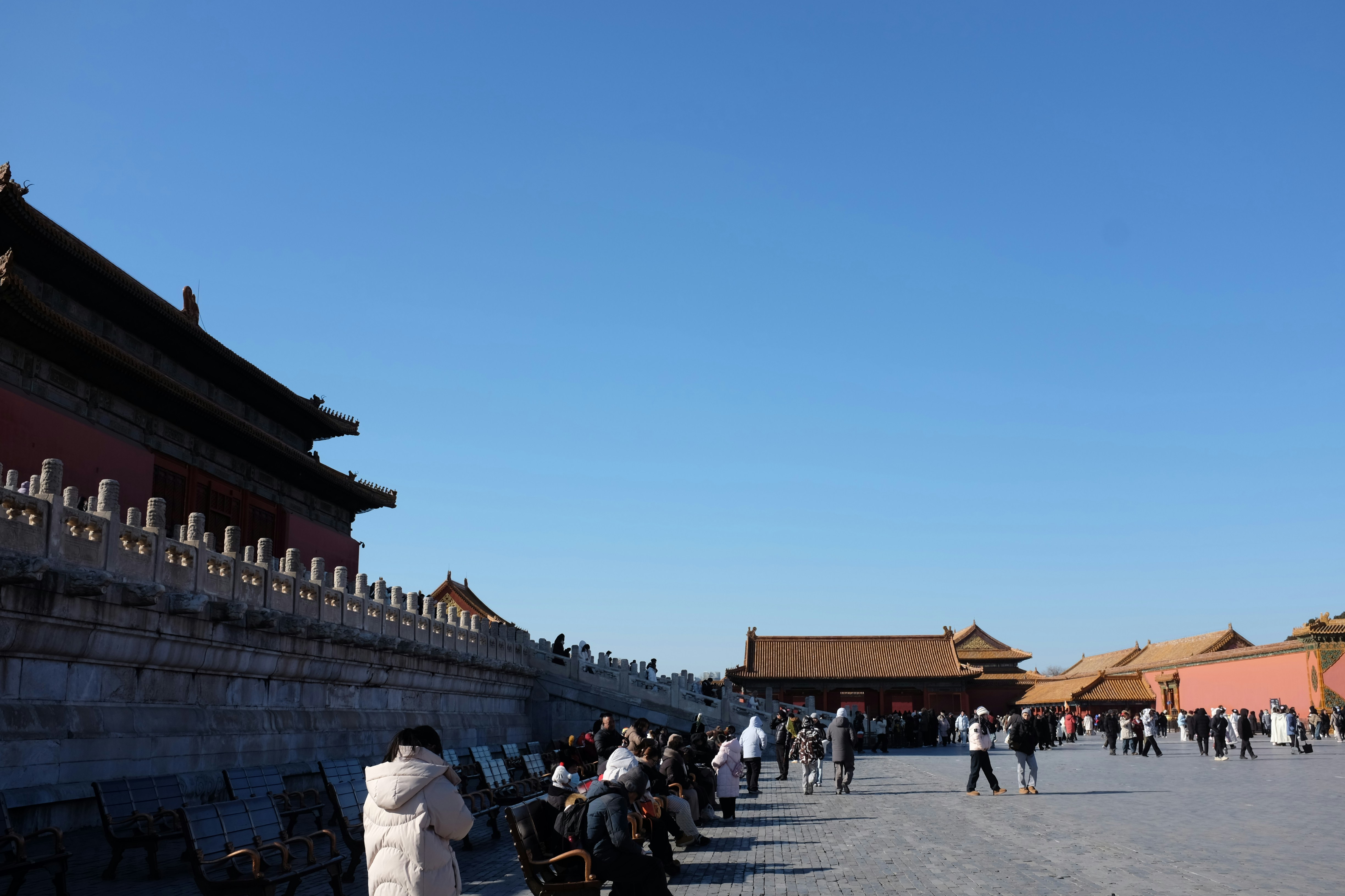 Sunlit Complex: A Corridor of History Under a Clear Sky