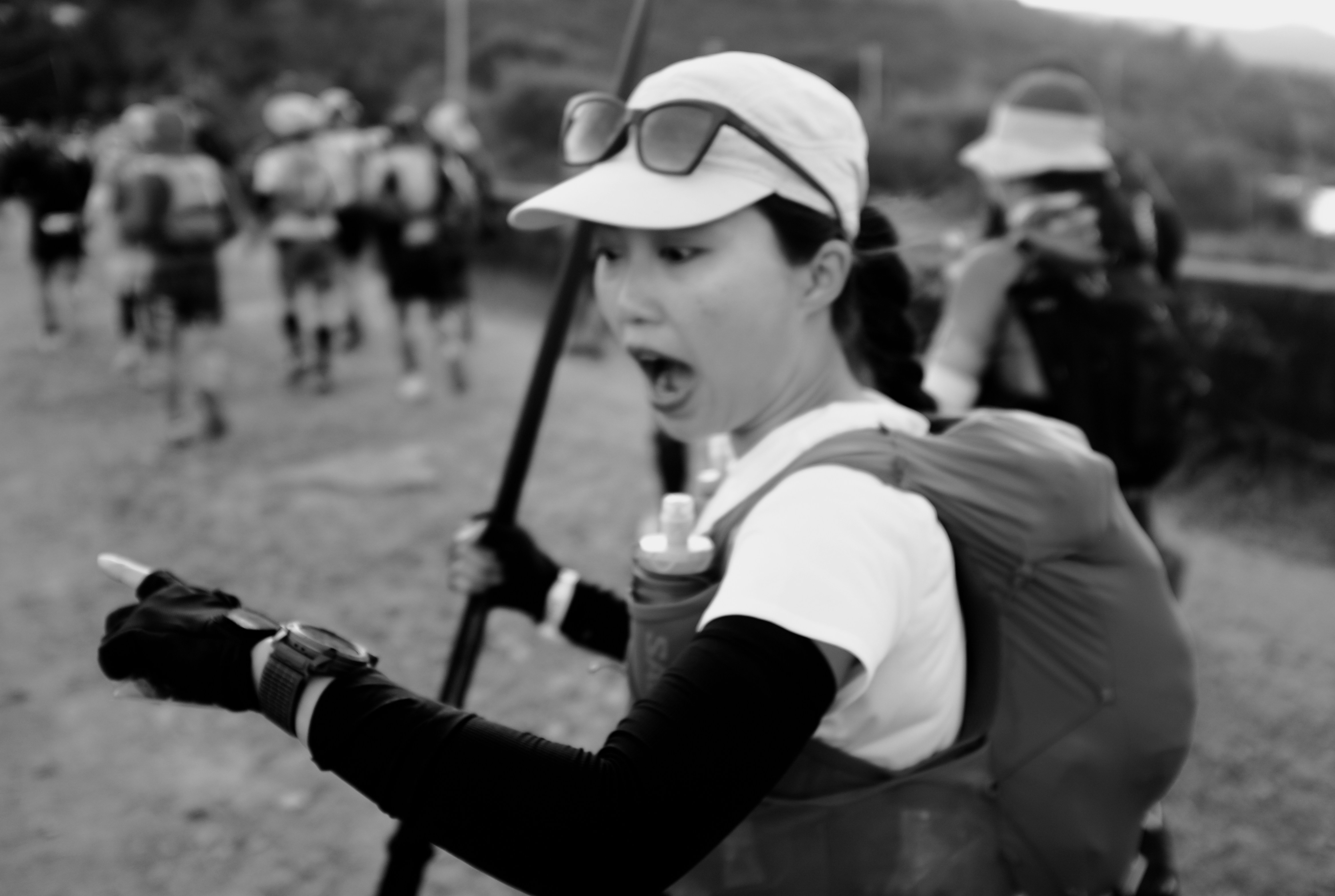 Rally Runner in Motion: A Mid-Stride Burst toward the Lens