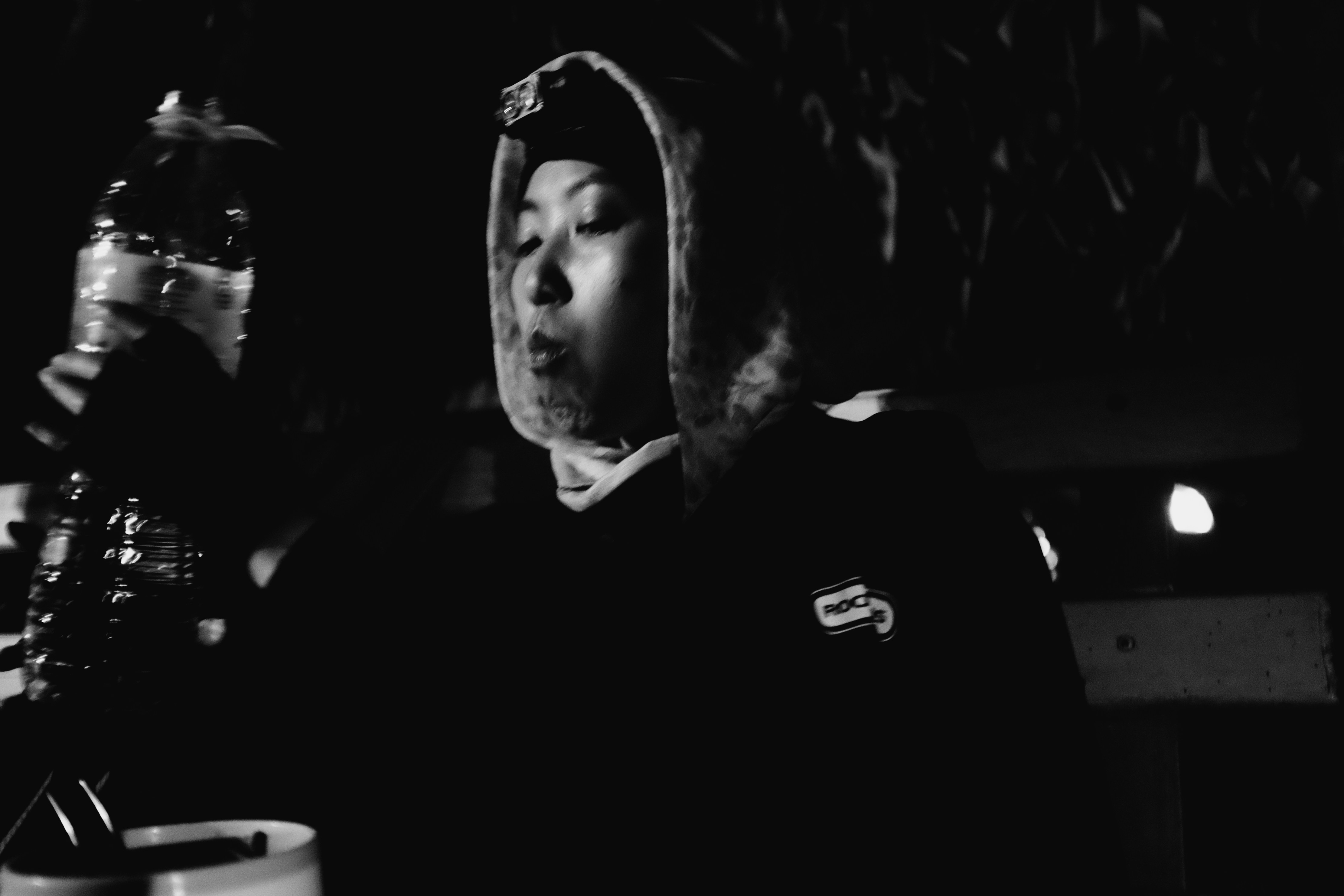 Midnight Harbor: A Quiet Moment With a Bottle and Hoodie