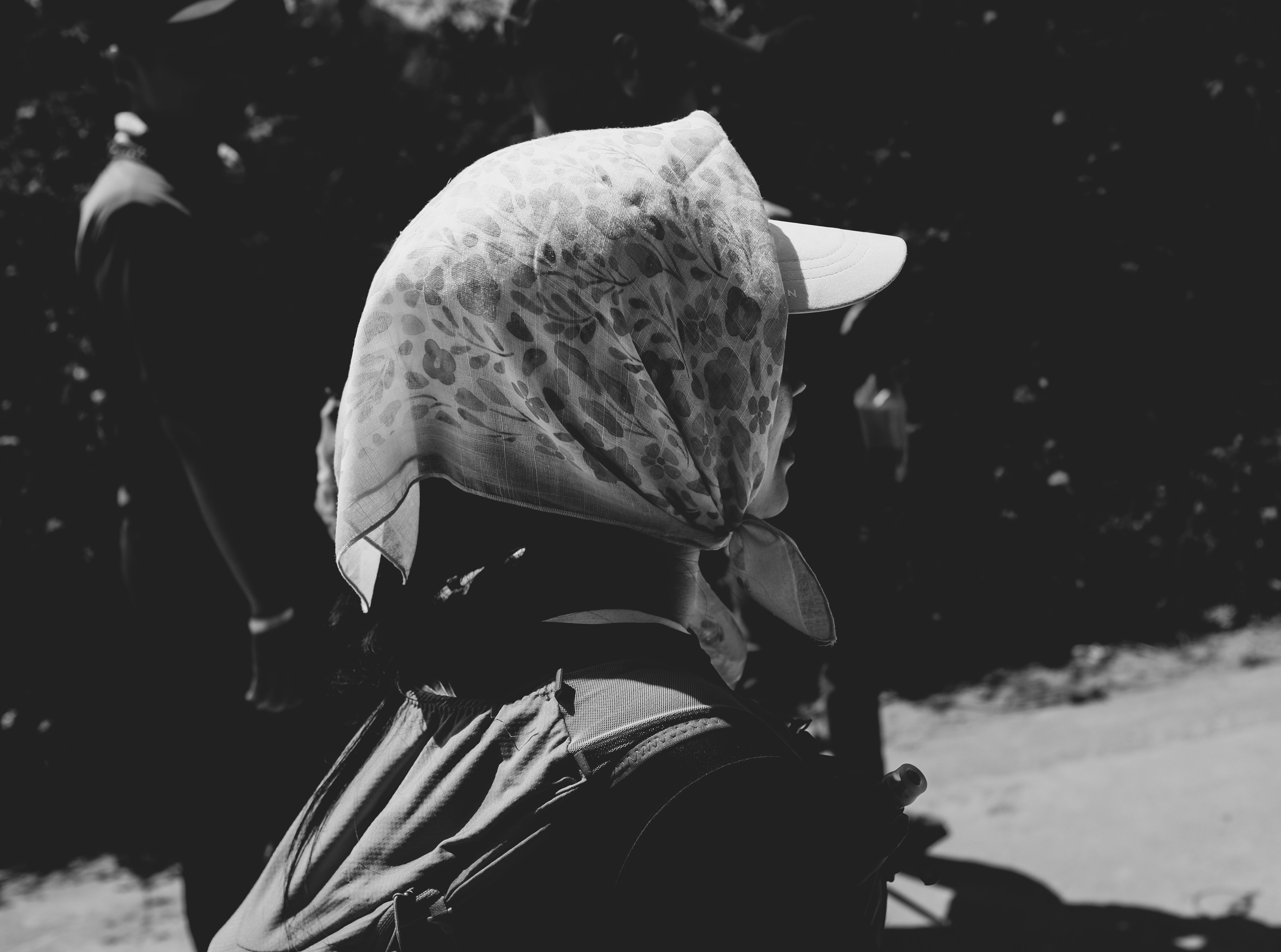 Shaded Headscarf in a Quiet Outdoor Moment