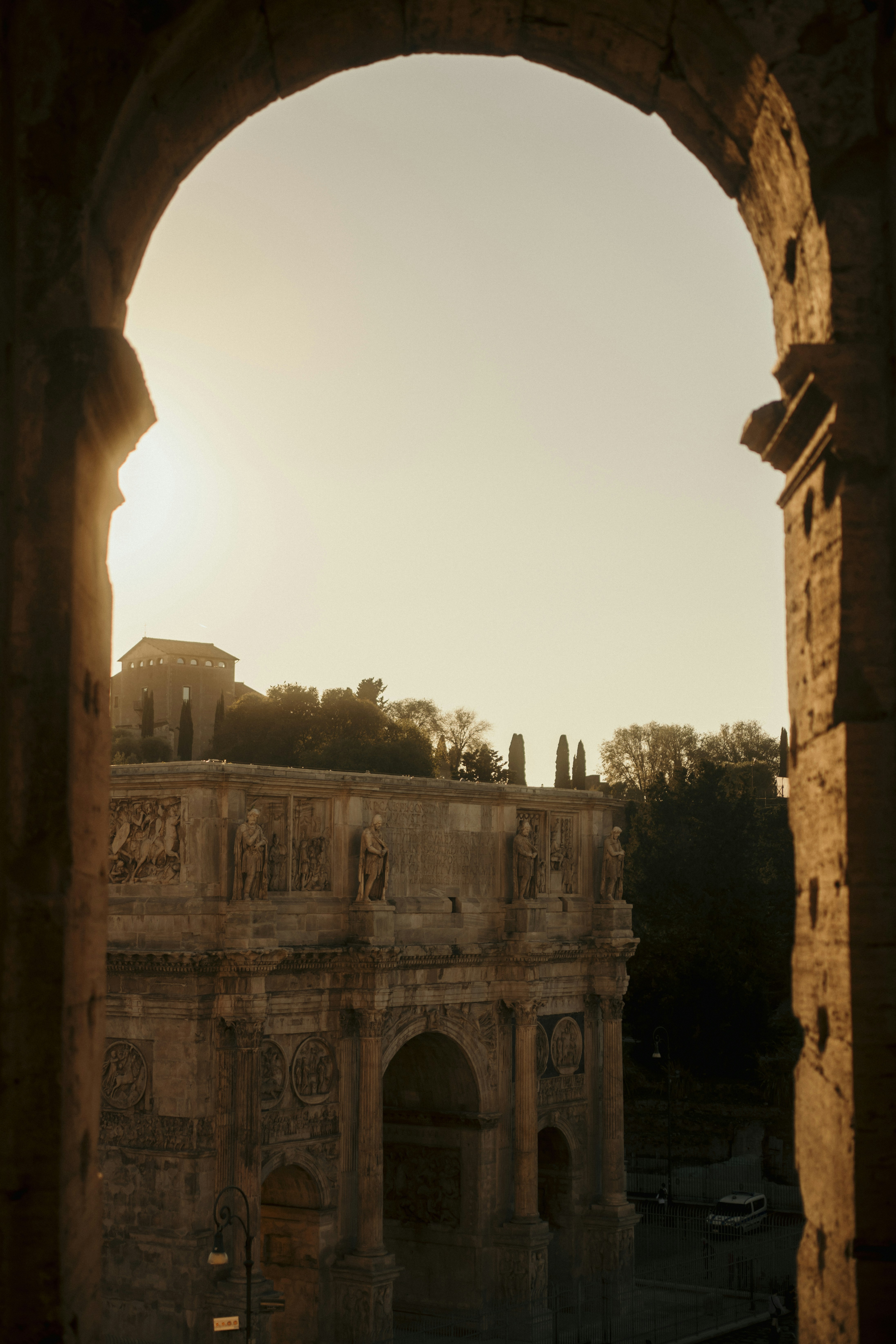 Sunlit Arc: Ancient Archway Framing a Time-Worn Triumph