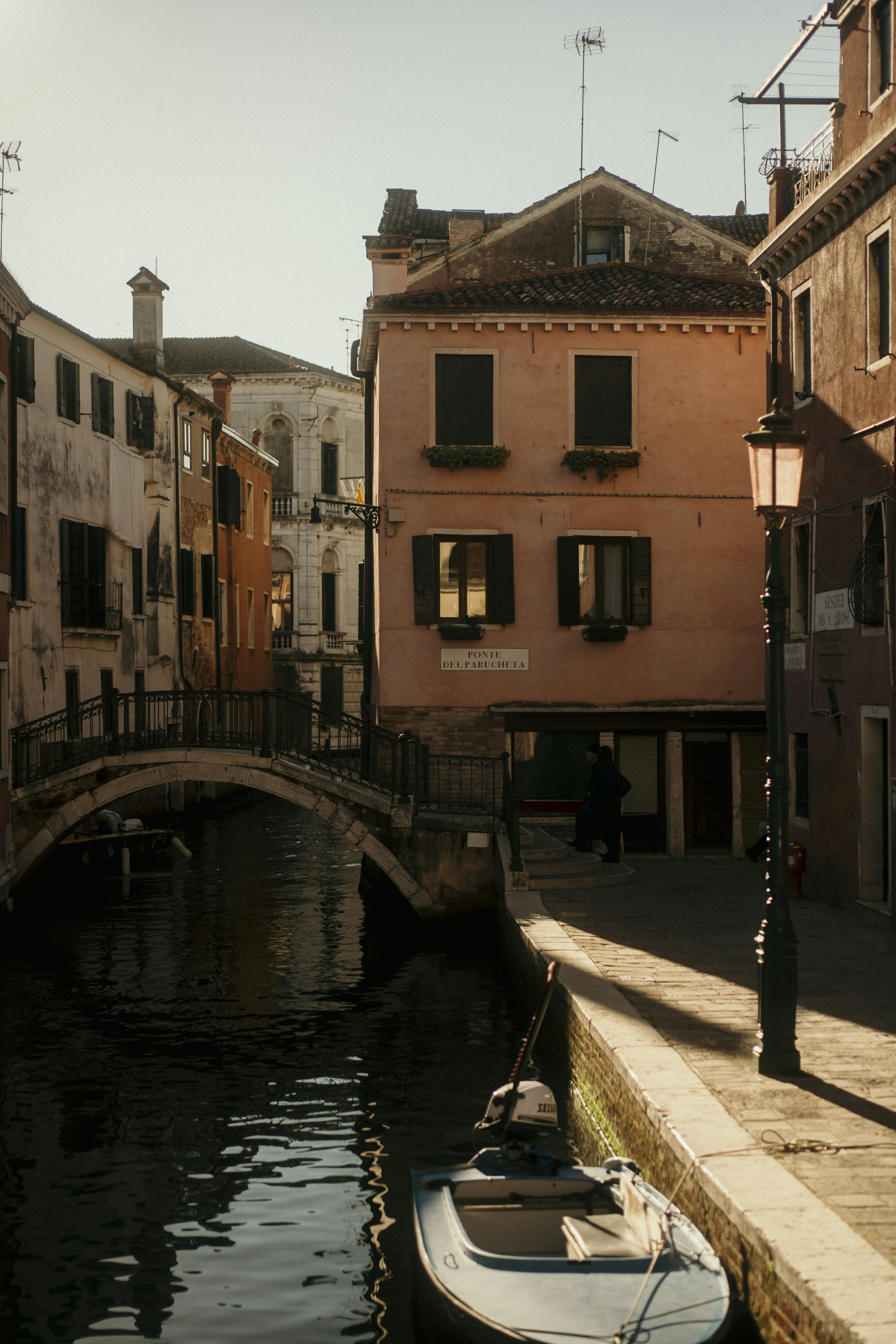 Venetian Canal Quiet Under Warm Afternoon Light