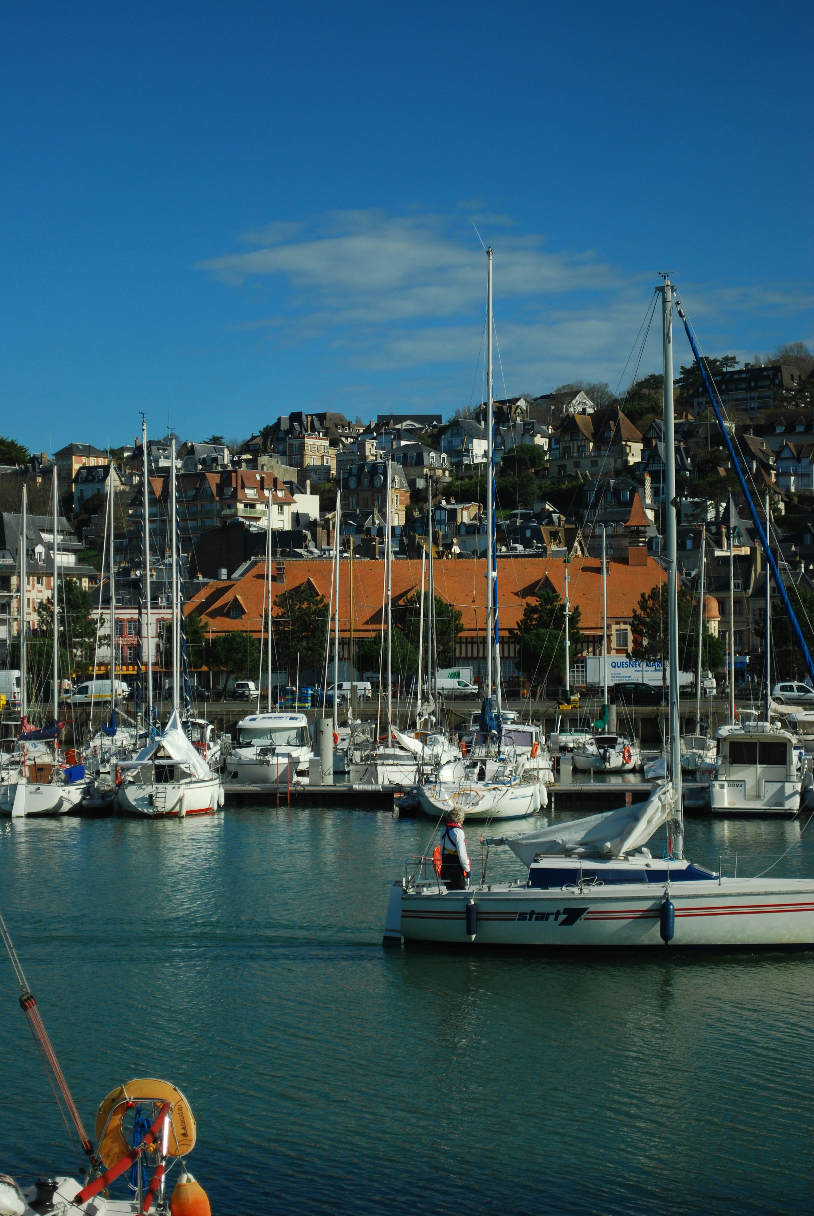 Harbor Midnight: Boats and Townrise over a Quiet Marina
