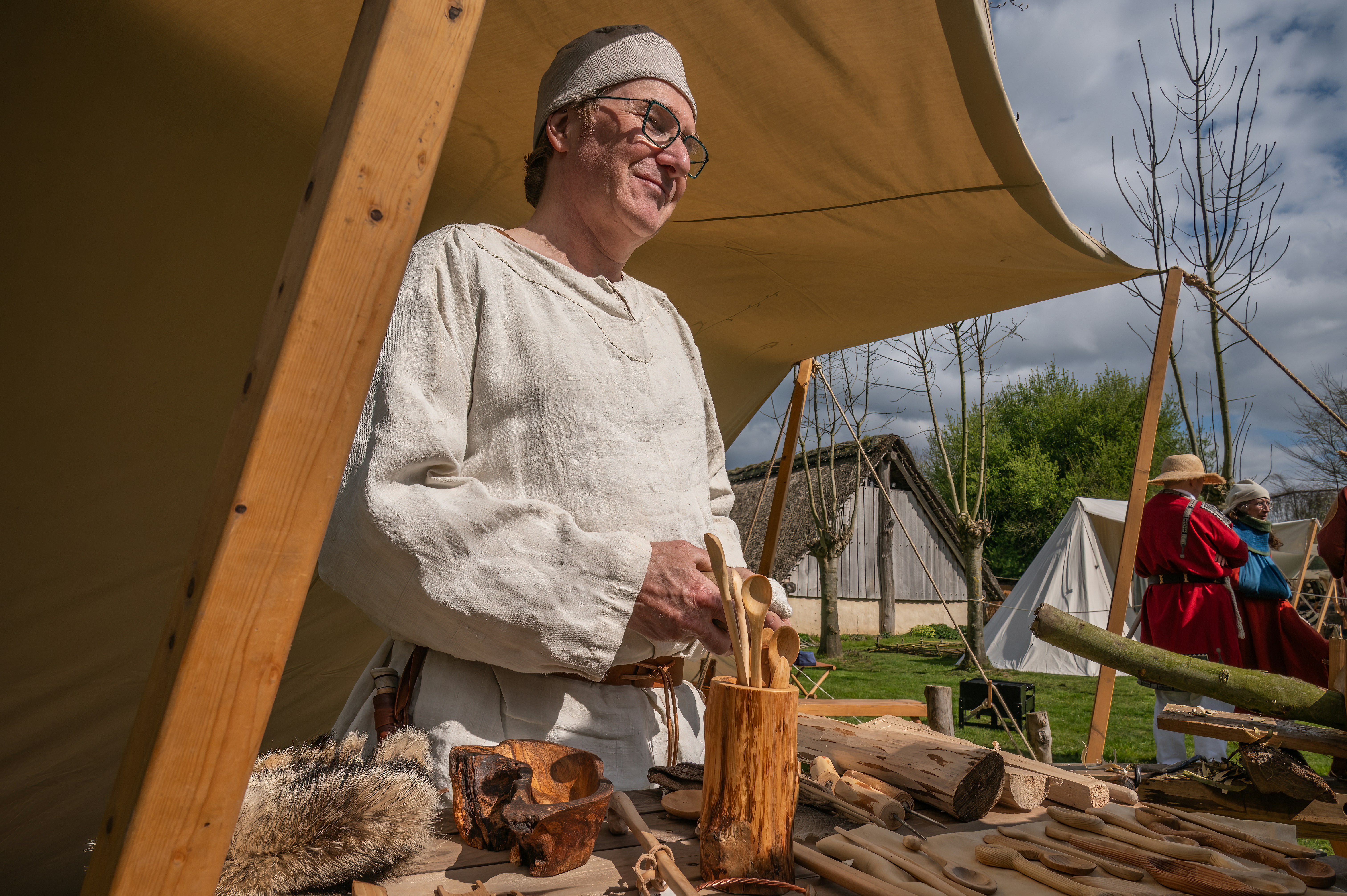 Heritage Handicraft: Carved Wooden Tools at a Rustic Camp
