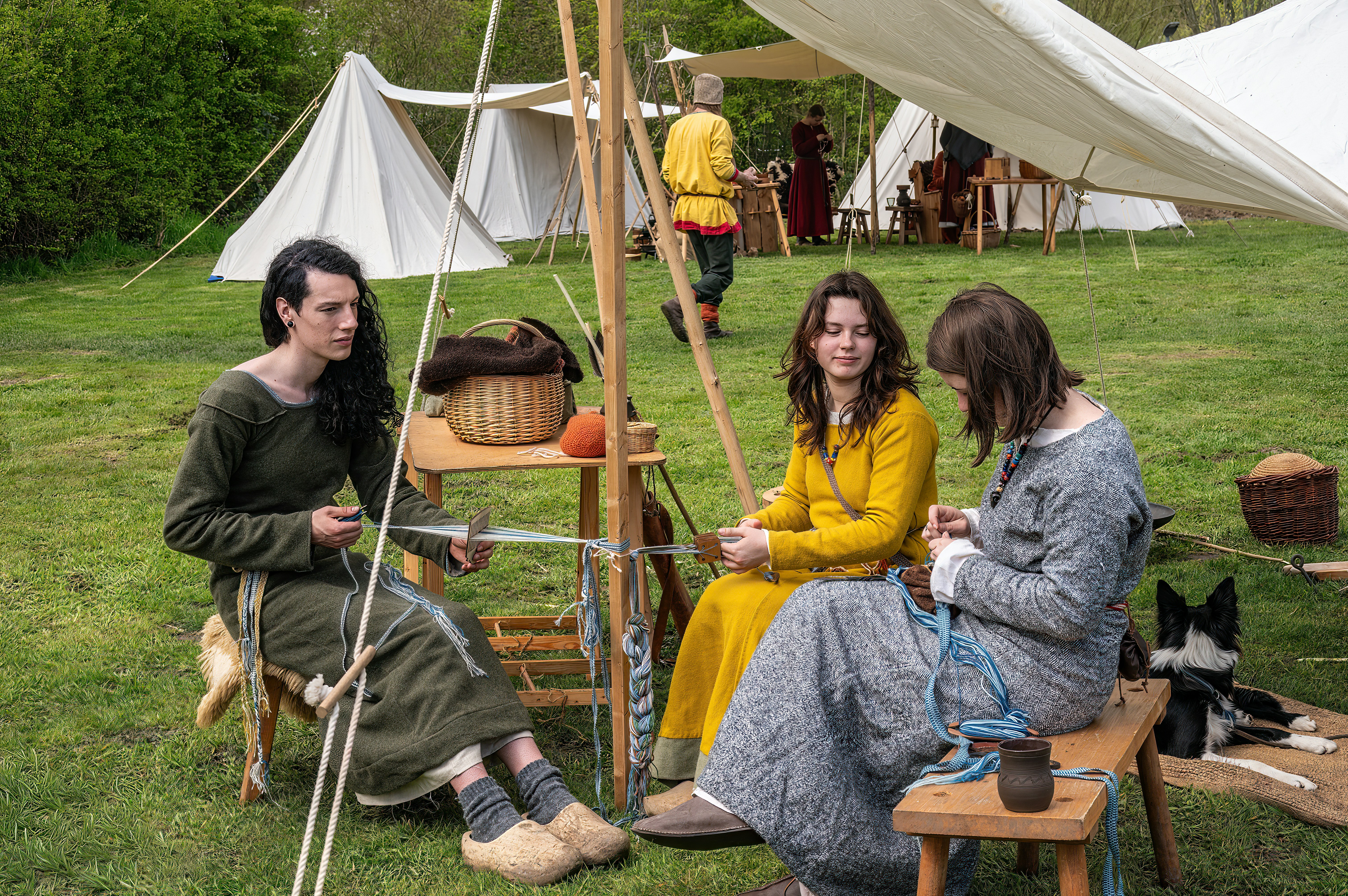 Medieval Weavers at a Riverside Camp