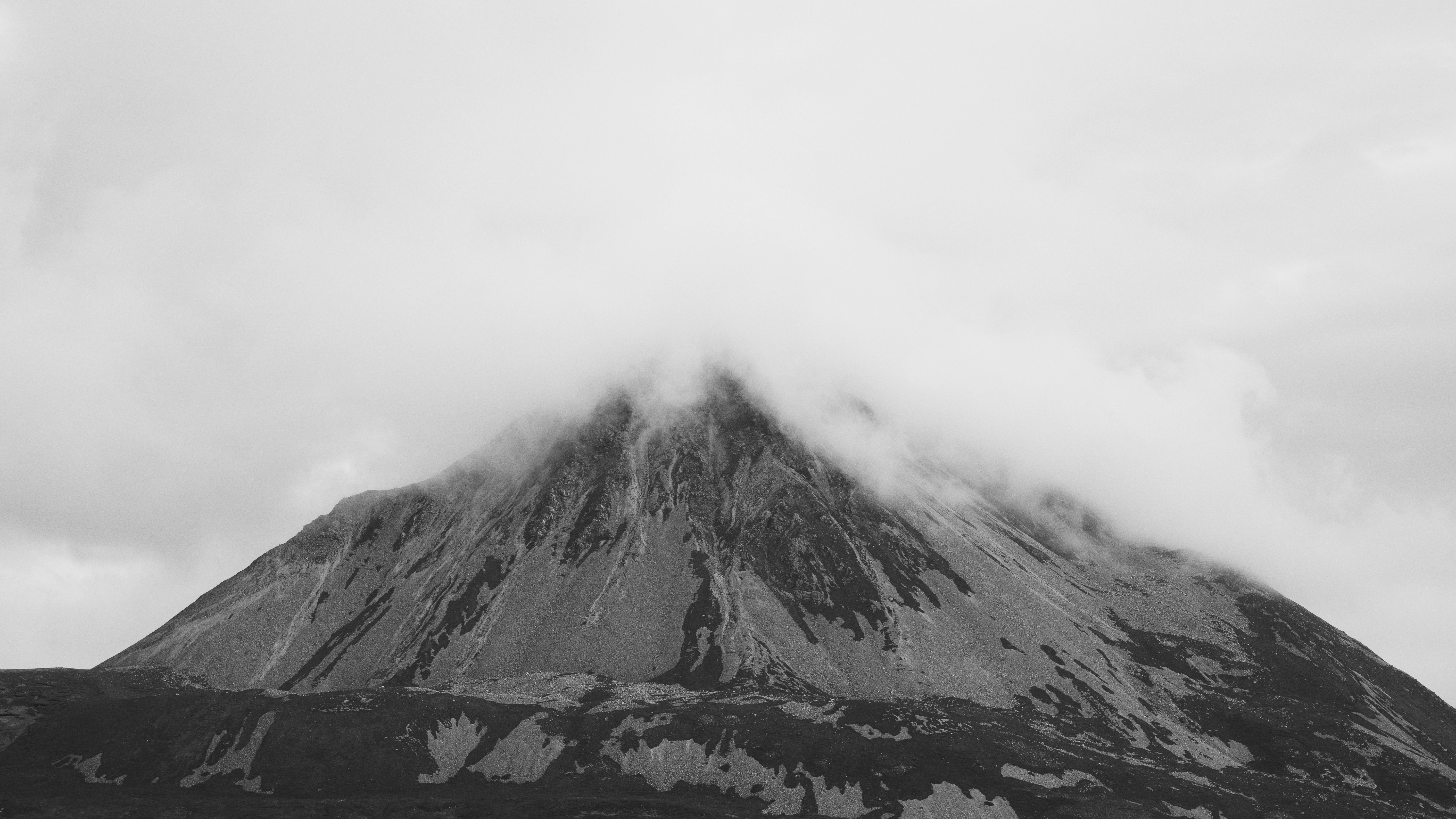 Mist Crowned Peak: A Monochrome Ascent