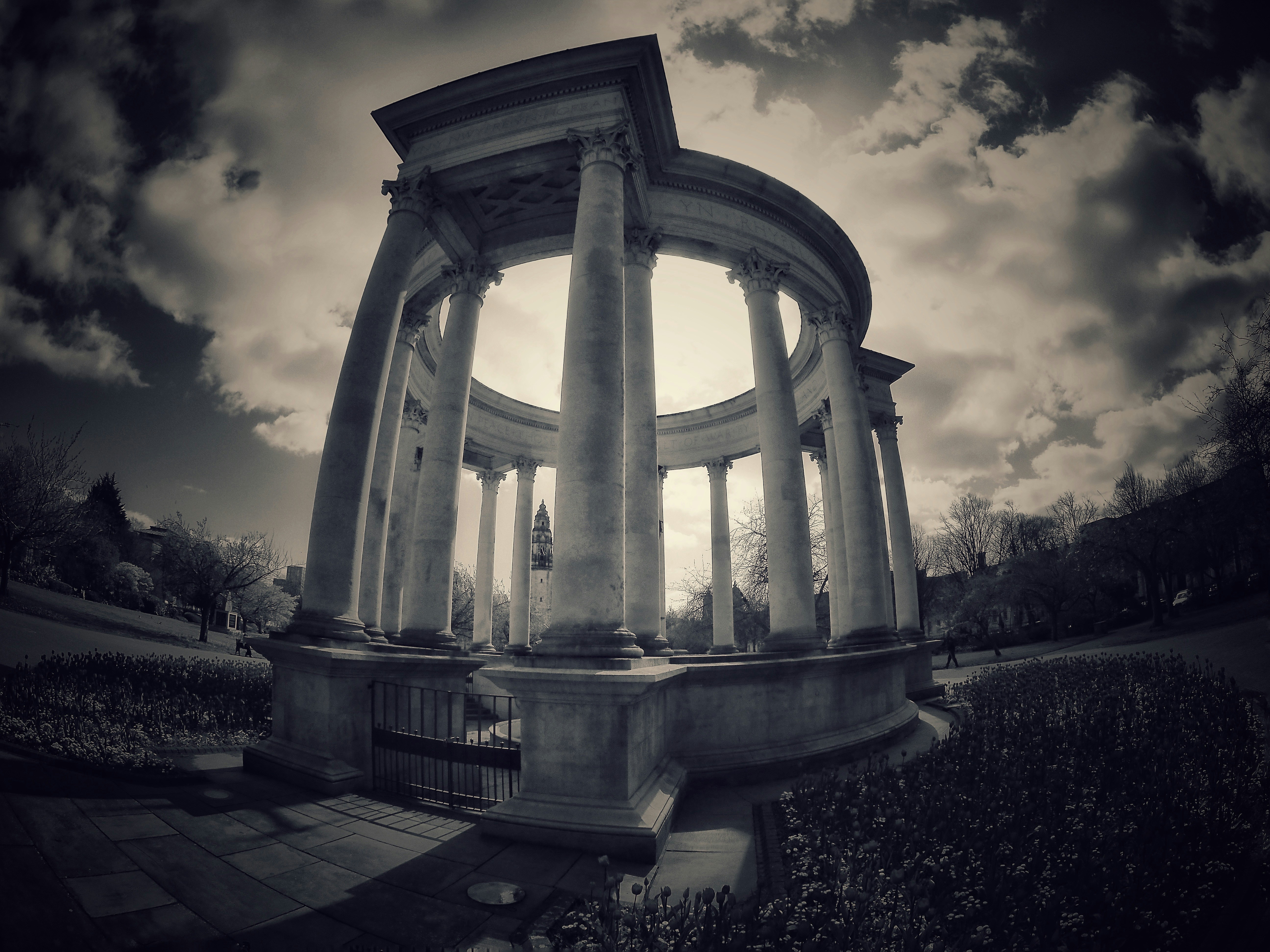 Circular Temple in Monumental Park: A Dramatic Wide-Angle Grimace