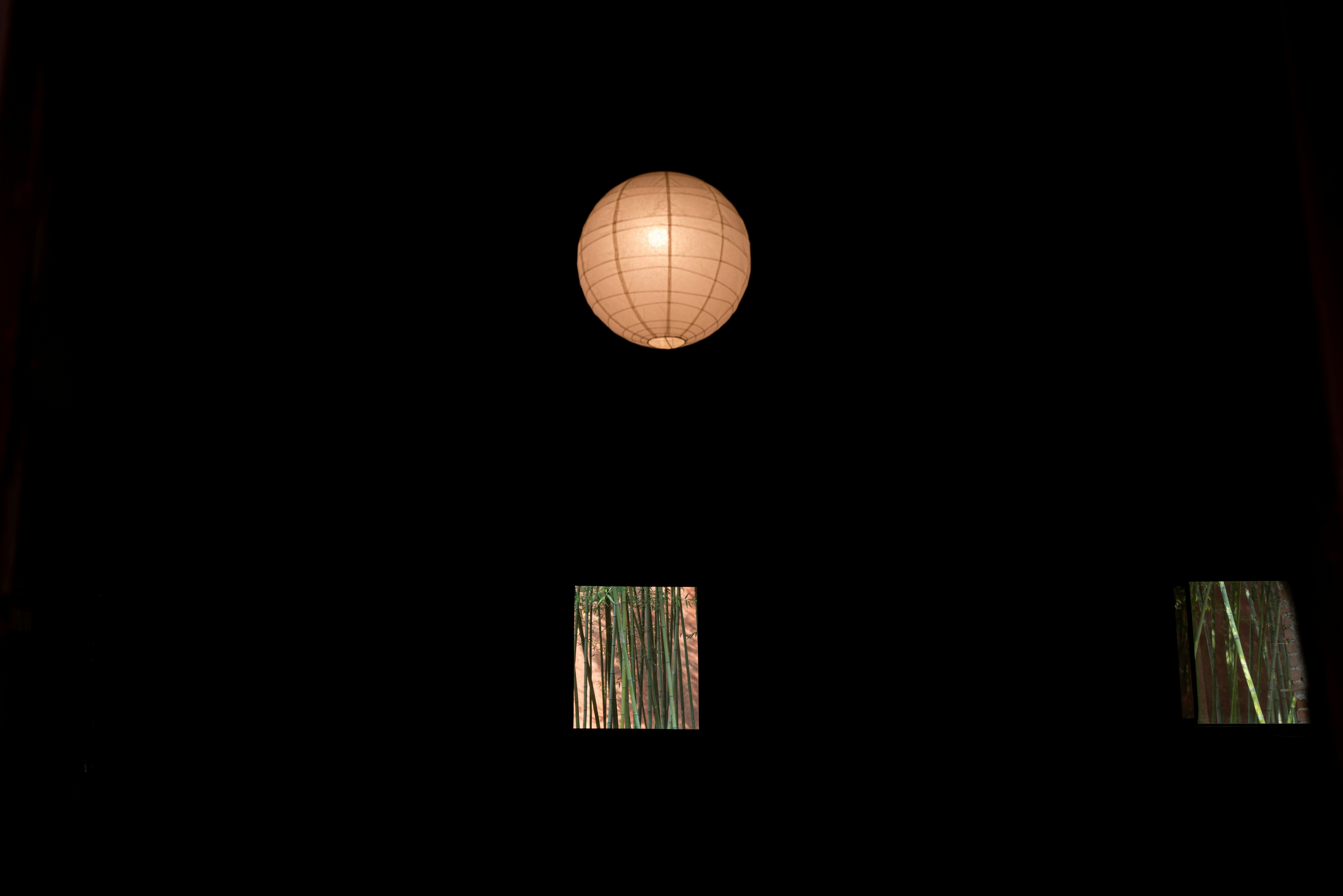 Floating Lantern Above a Dark Stage