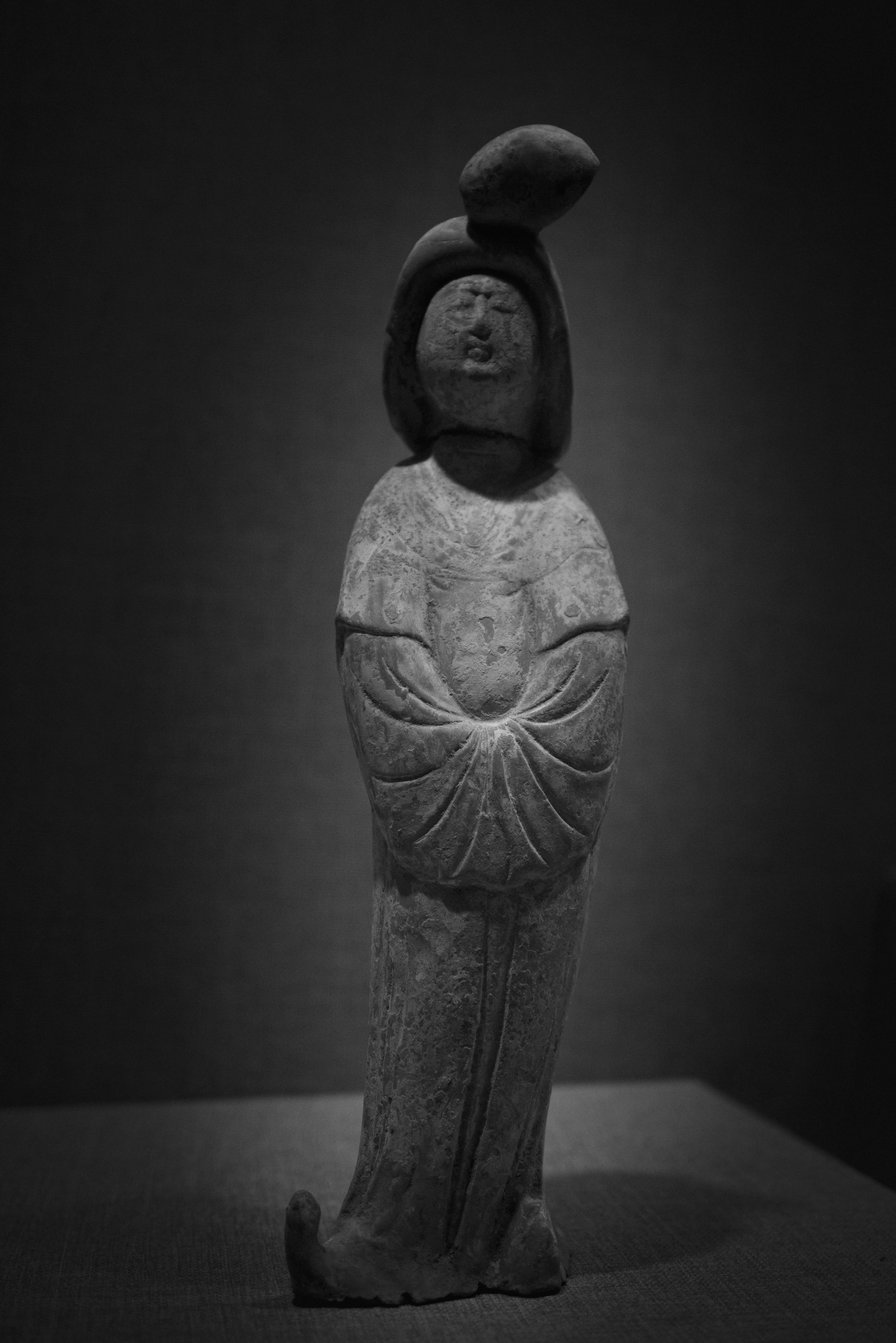 Stone Sentinel: A Quiet Gaze Beneath a Halo