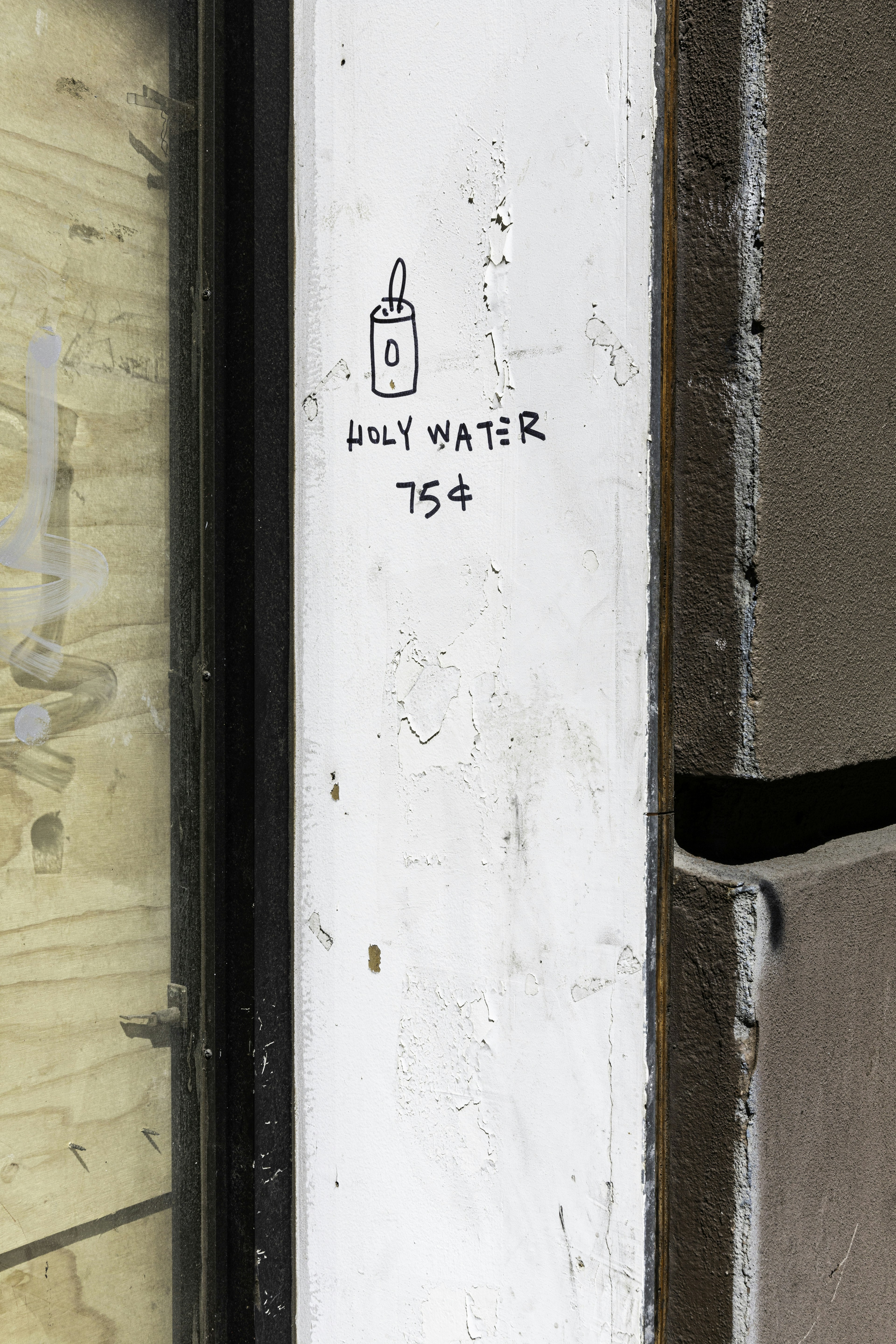 Holy Water Scribble Along a Crumbling Wall