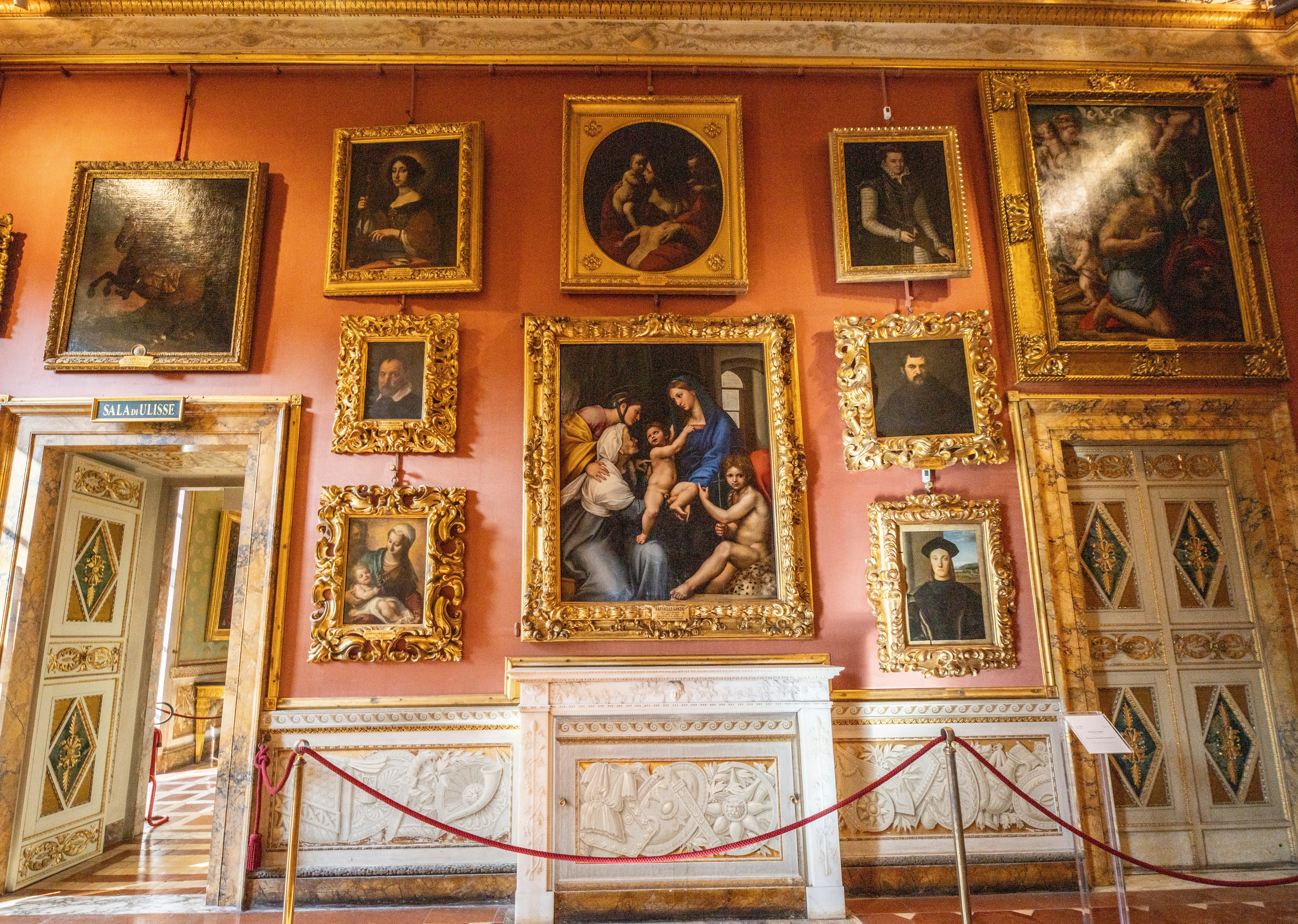 Ornate Gallery Portraits Framing a Central Sacred Scene
