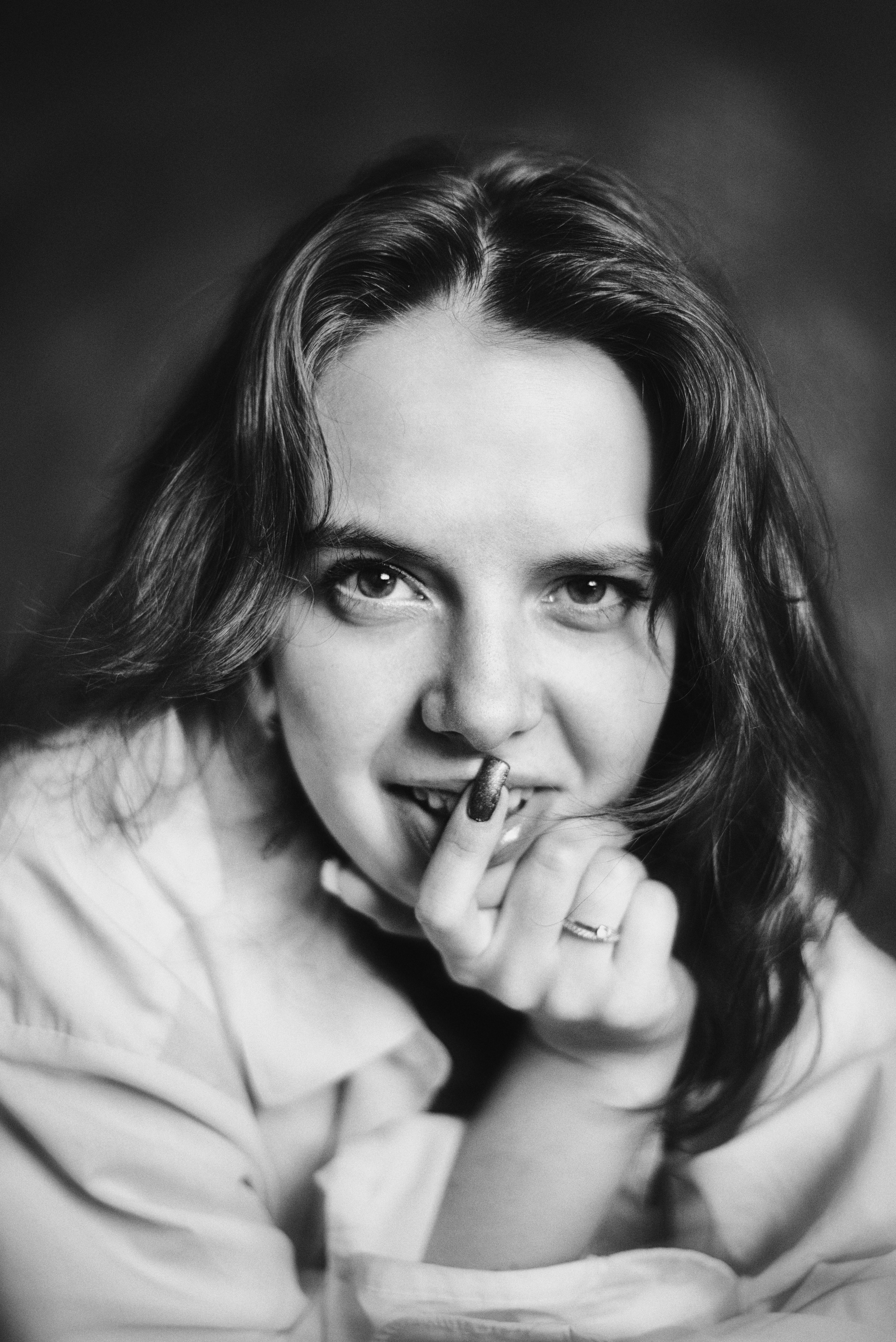 Eyes in a Quiet Moment: Soft Light on a Contemplative Smile