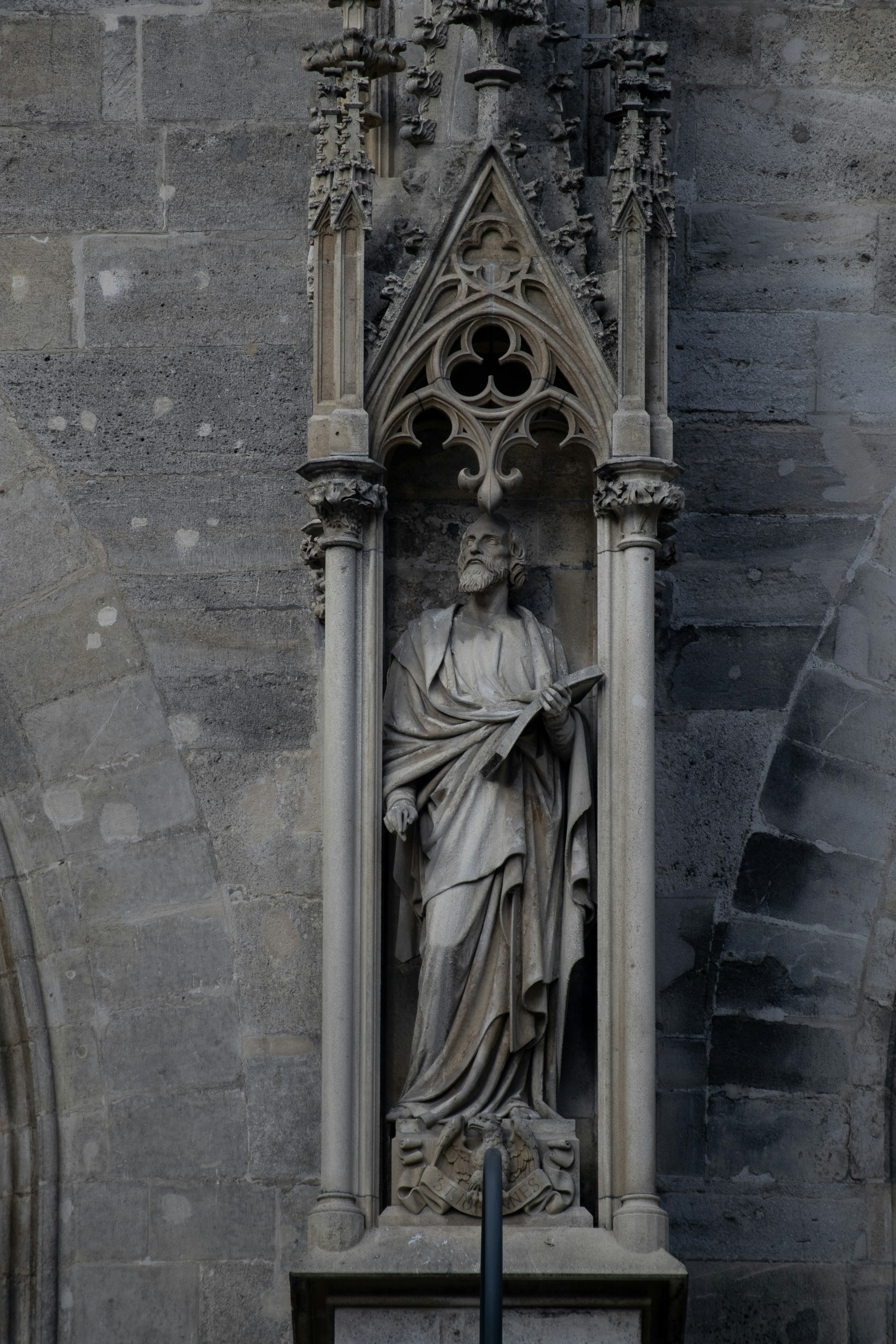 Gothic Niche: Monumental Saint Guarding Stone Threshold