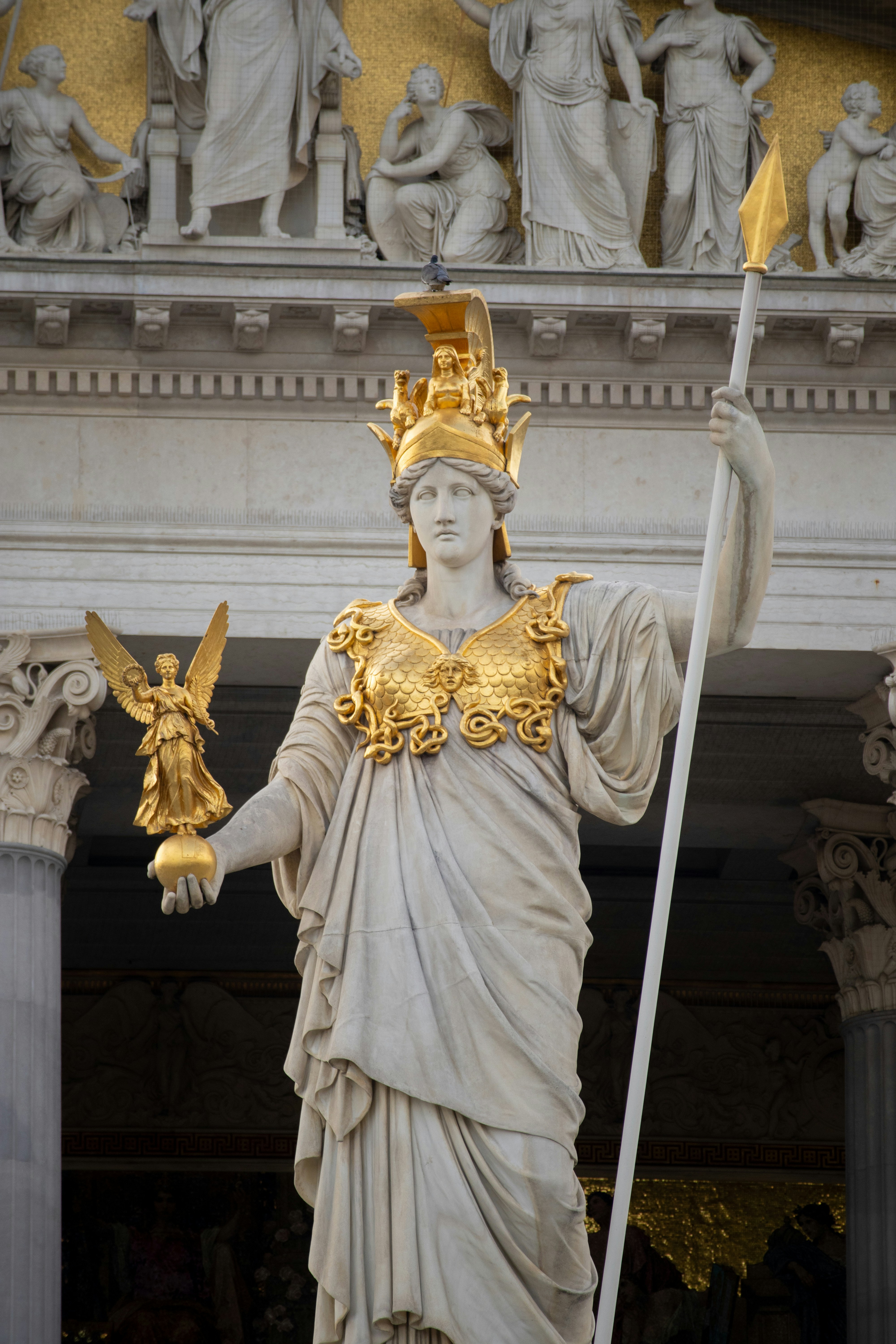 Golden-Sculpted Guardian: Triumph Crowned in Marble