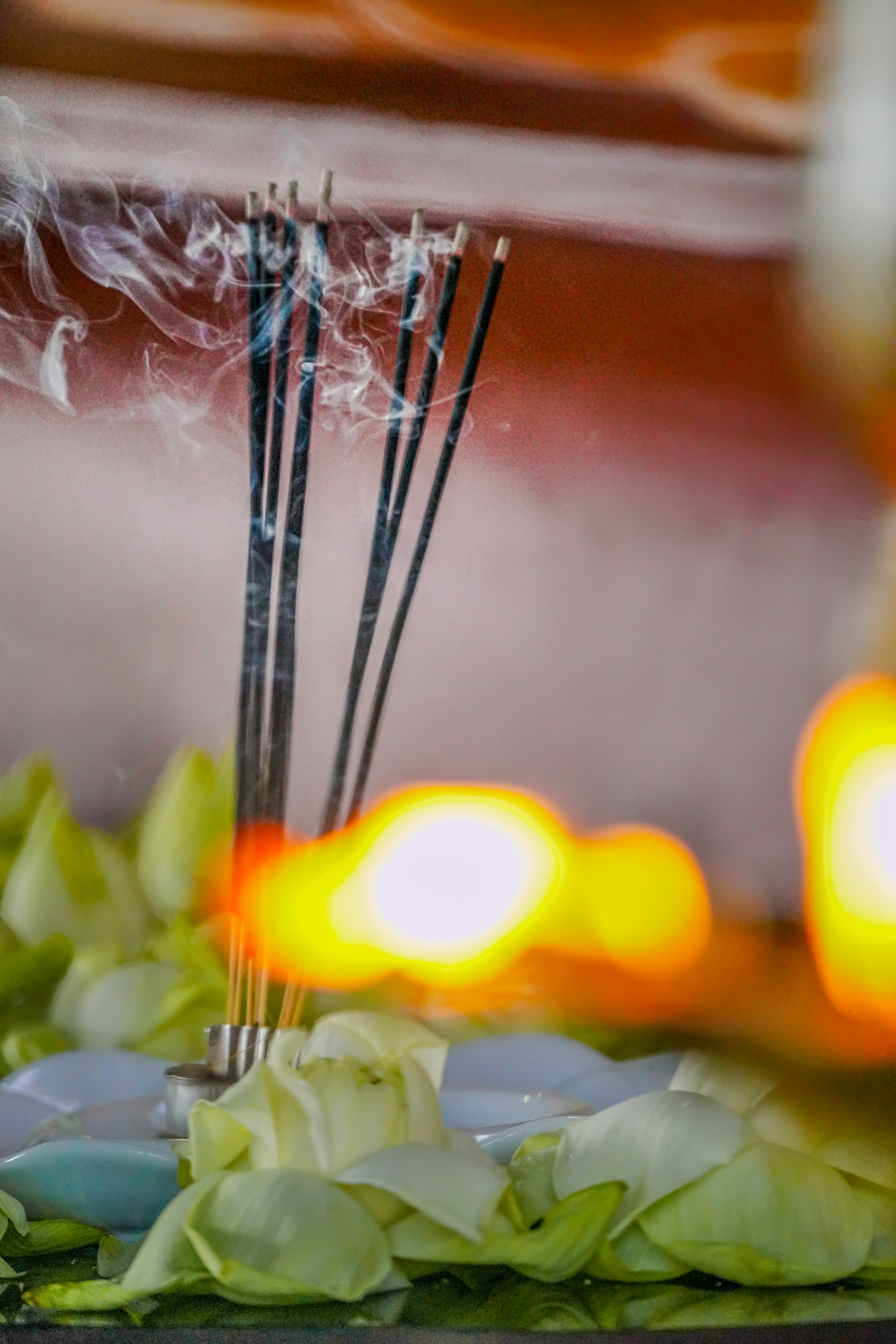 Rising Threads: Incense Beneath Soft Glimmer