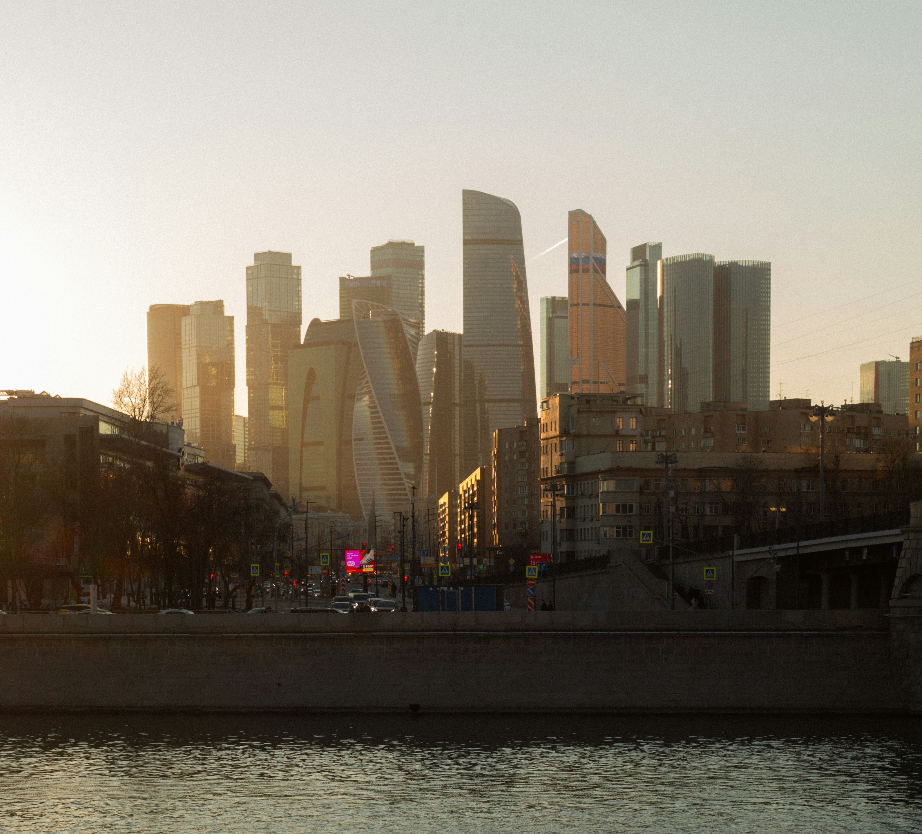 Dawn Over a Modern Mirage: City Silhouettes Beyond the Thames-like Waterfront