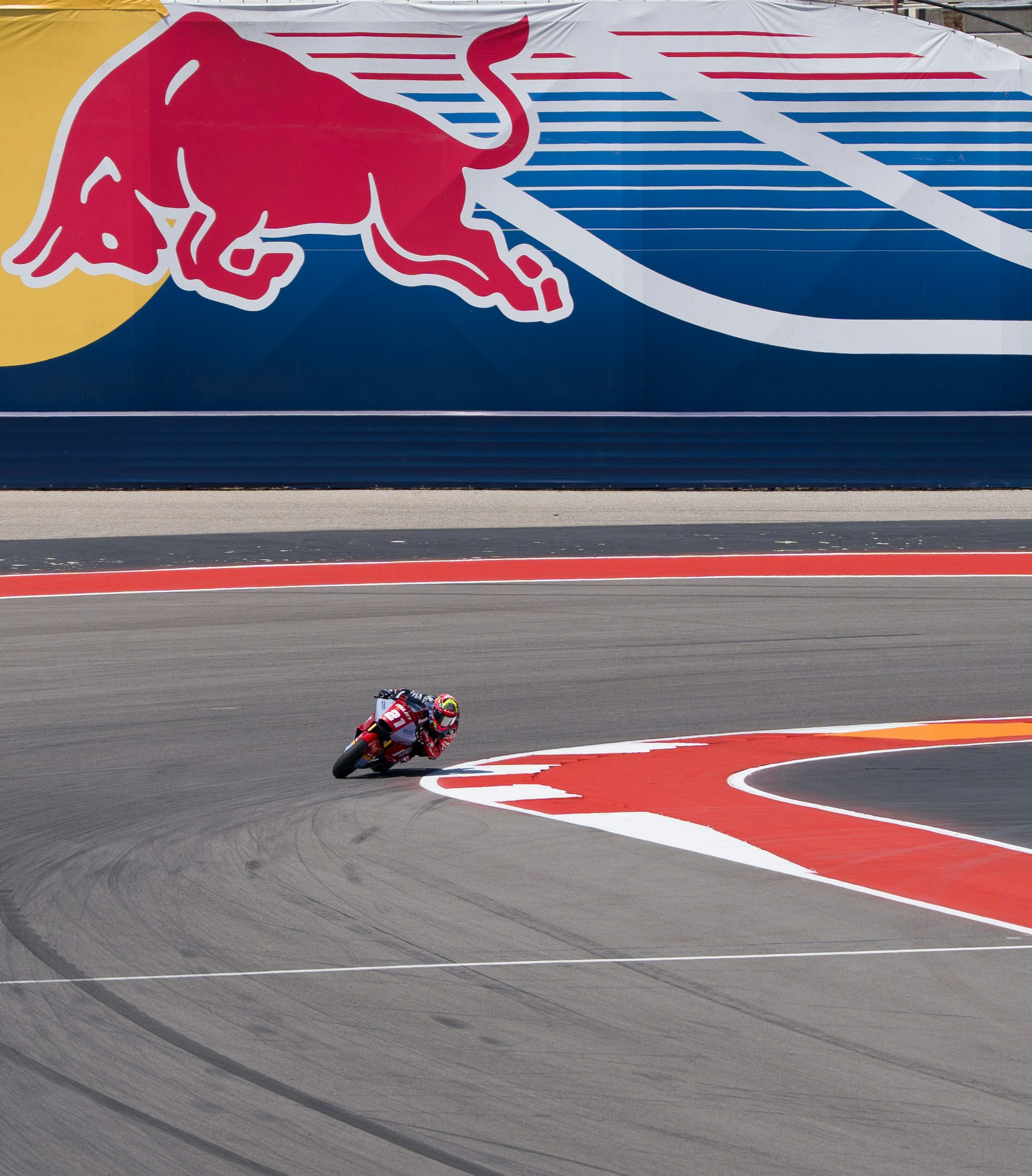 Low-Angle Tilt: Narrow Motorcycle Line Wleans Through Curved Track