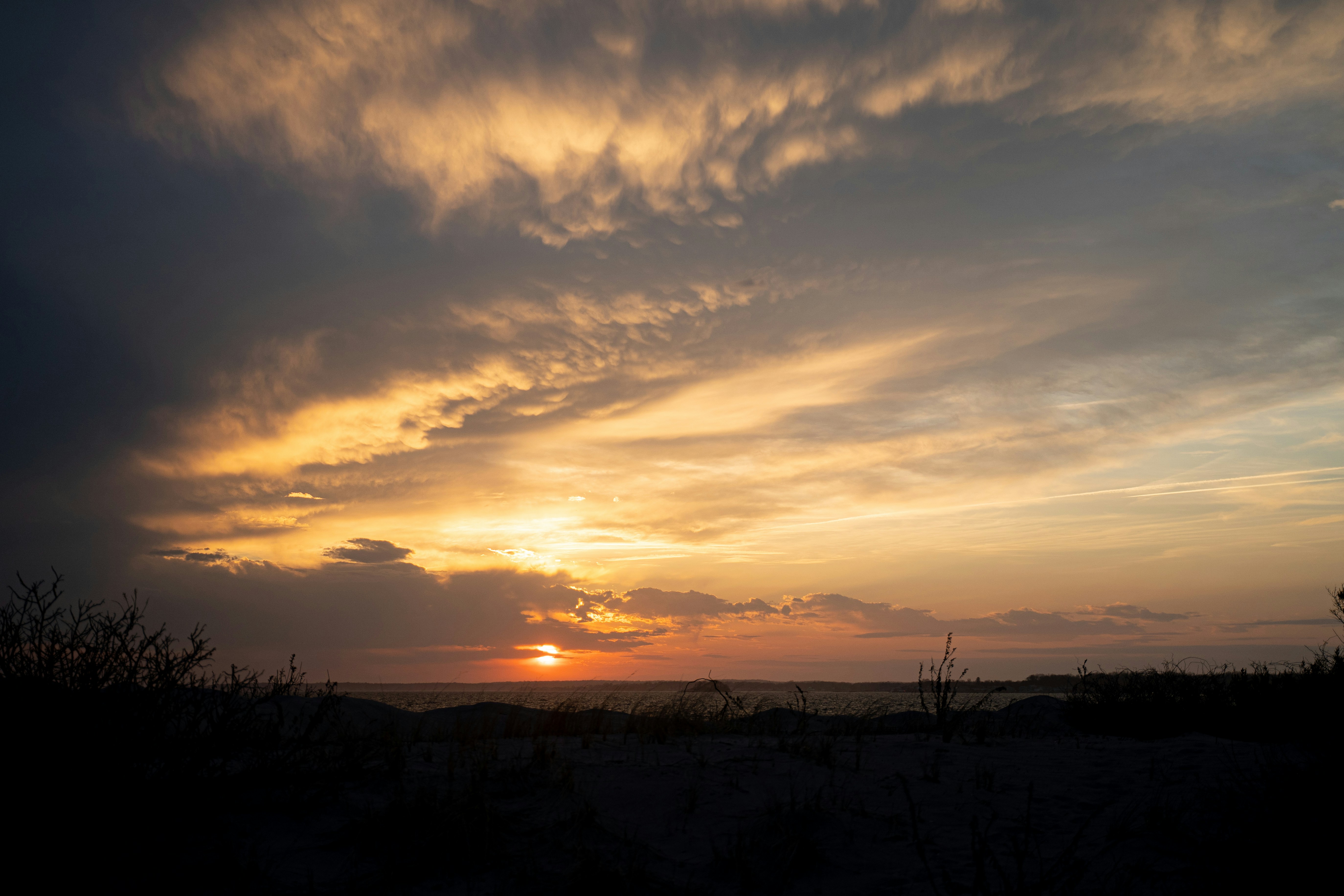 Horizon Kissed by Low Tide: Sunset Over Silent Dune