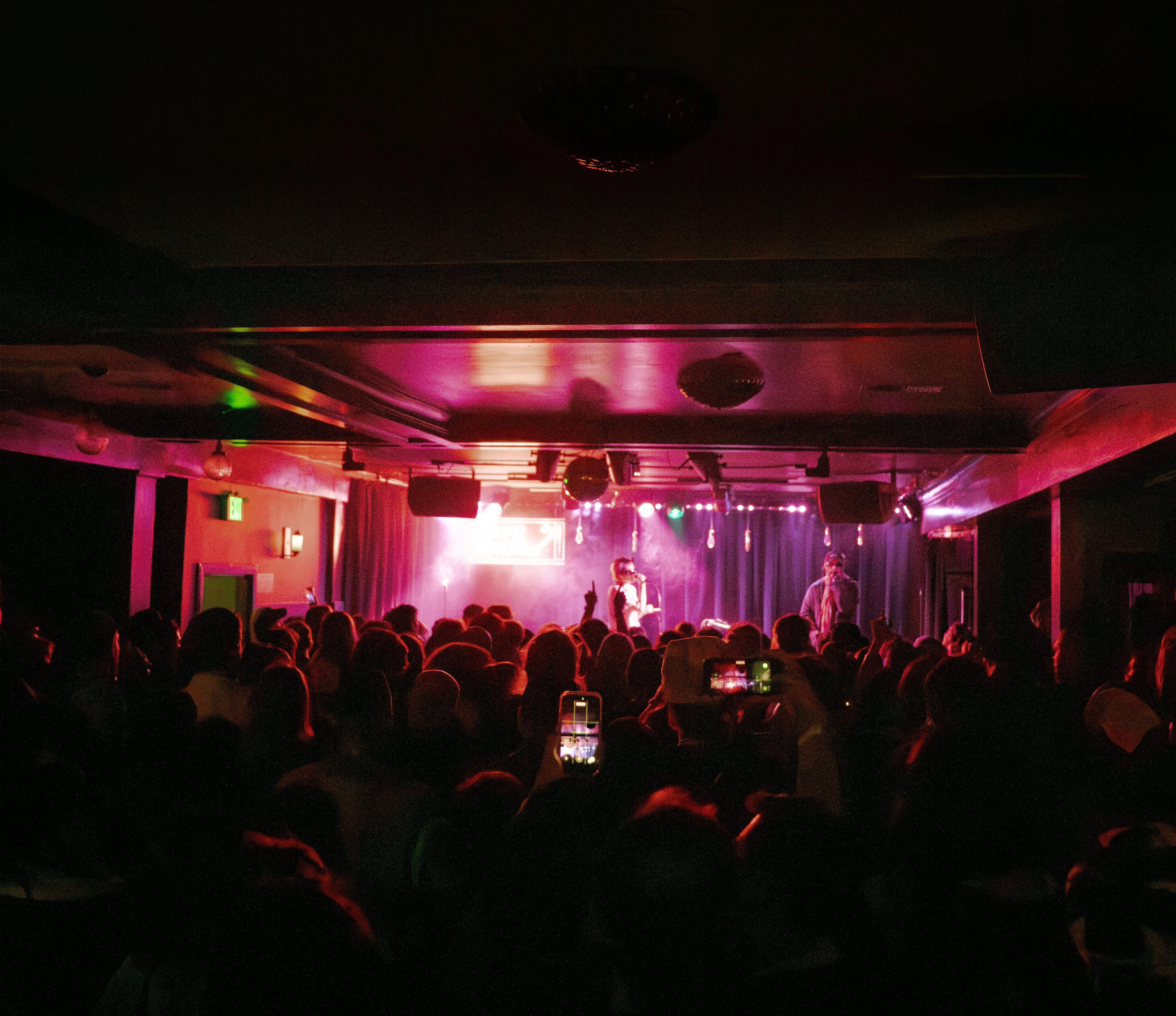 Midnight Reverie: A Packed Club Basks in Stage Light
