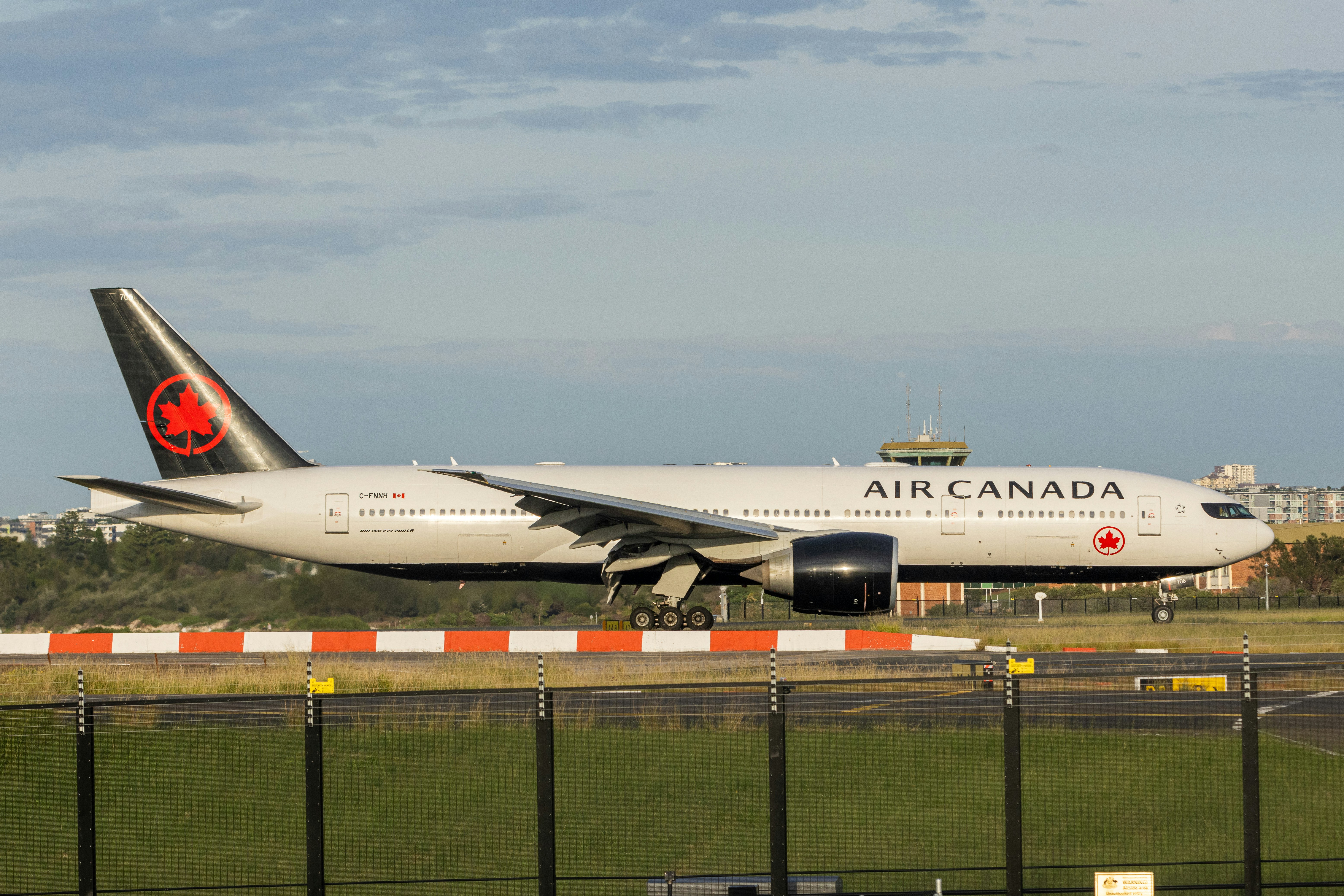 Air Canada Dreamliner on a sunlit taxiway
