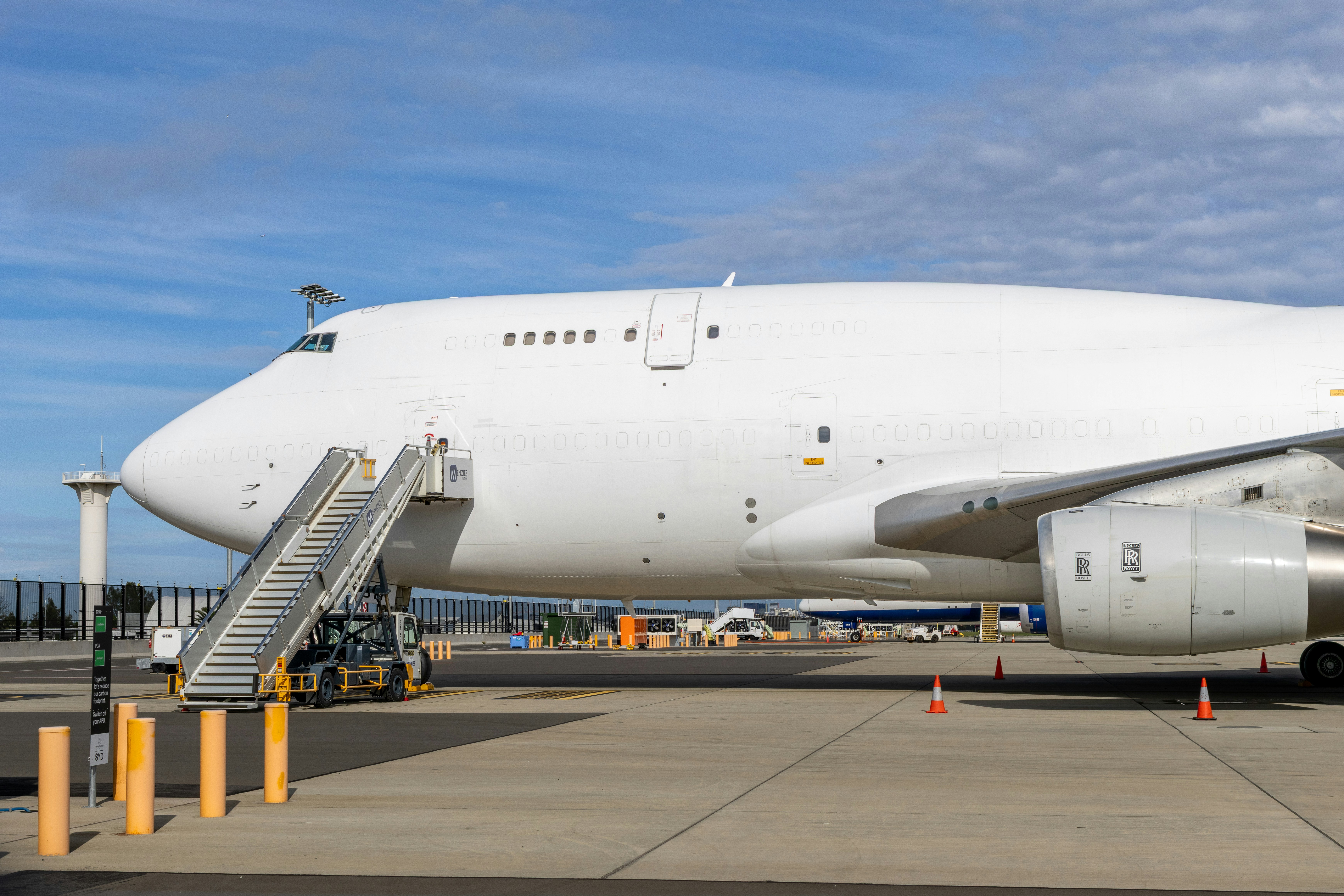 White Giant at the Gate: Jetway and Nose of a Jumbo