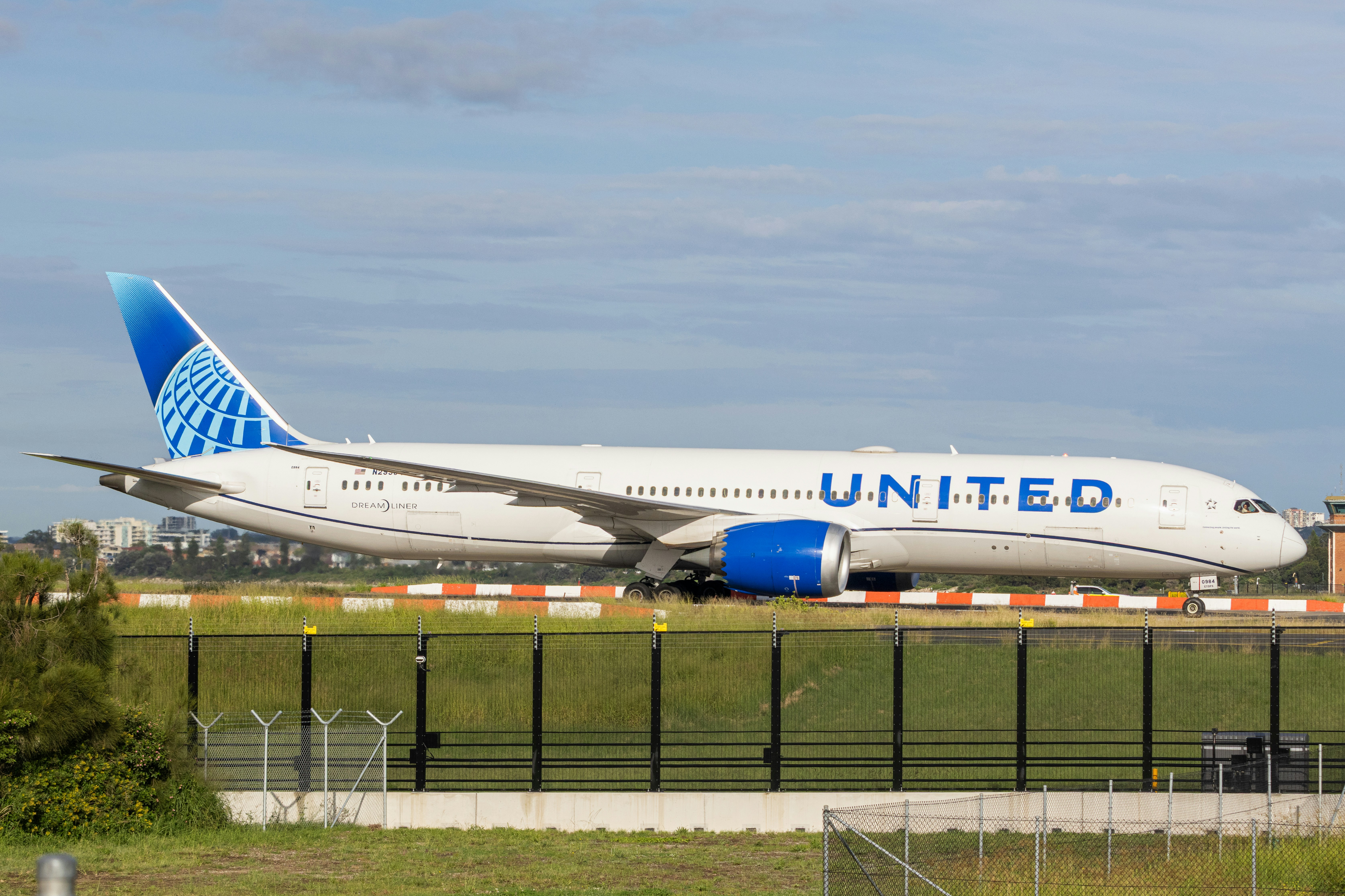 United in Motion: A United Airlines 787 on a sunlit taxiway