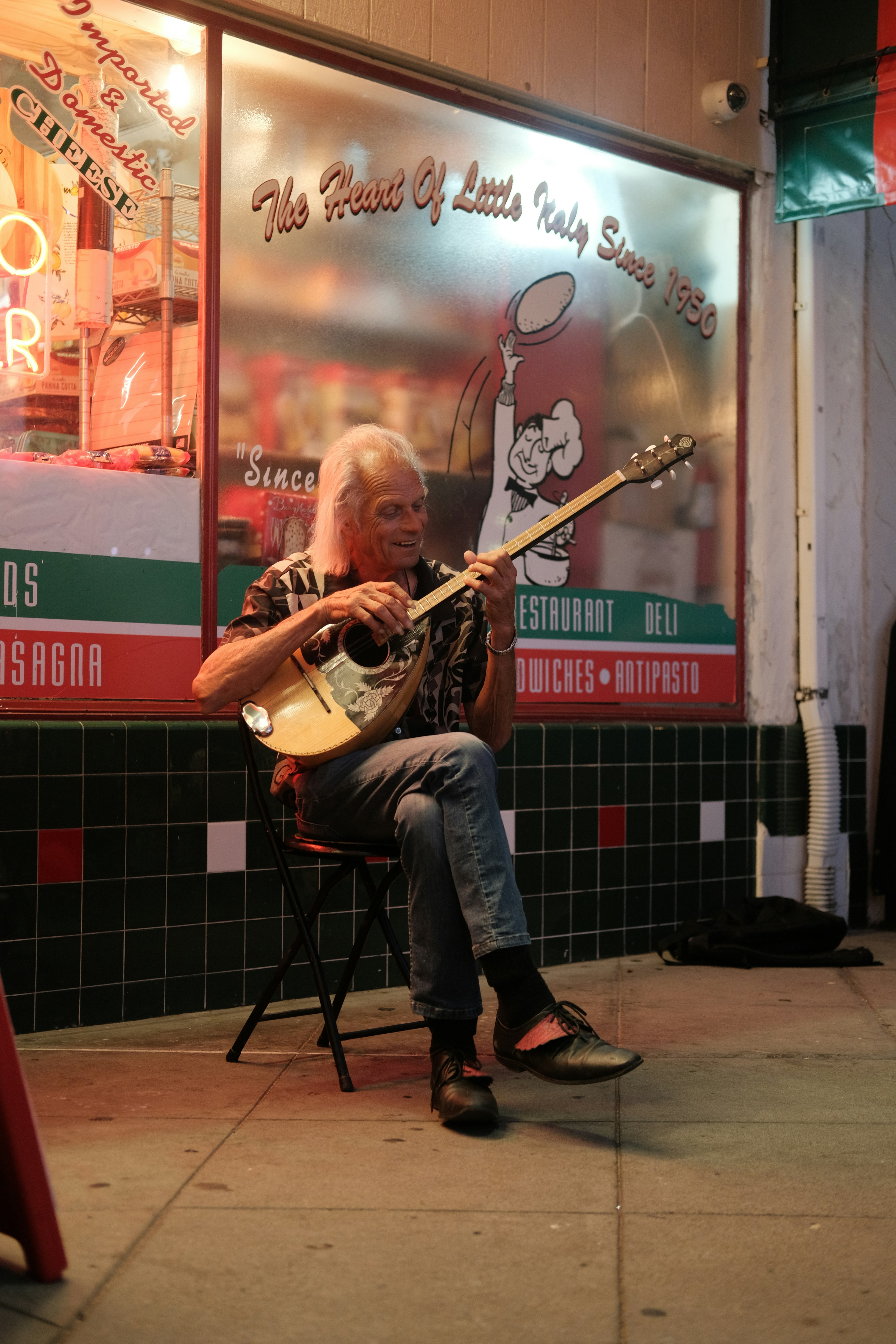 Guitar Serenade on a Neon Street