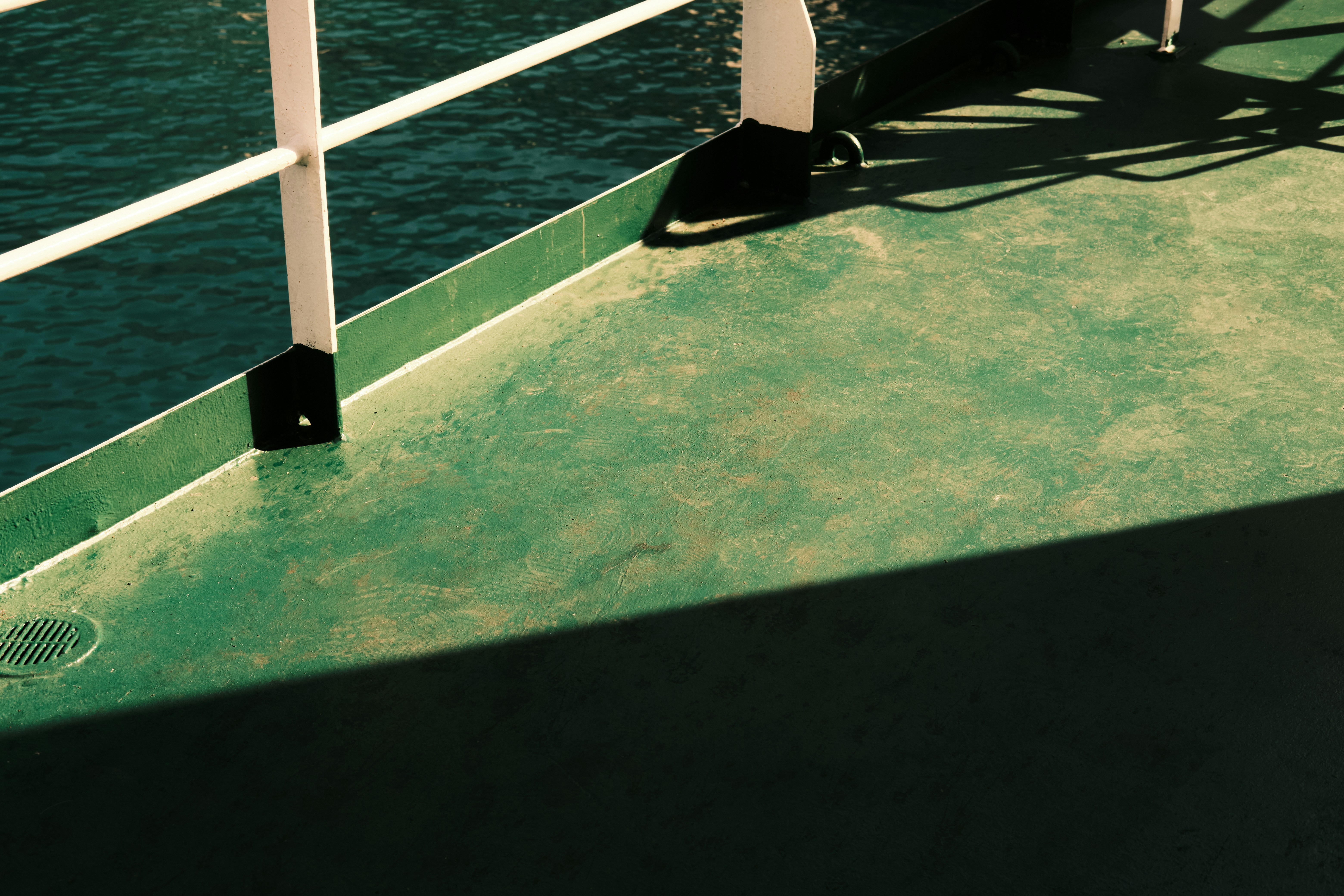 Shadows on a Quiet Deck by the Water