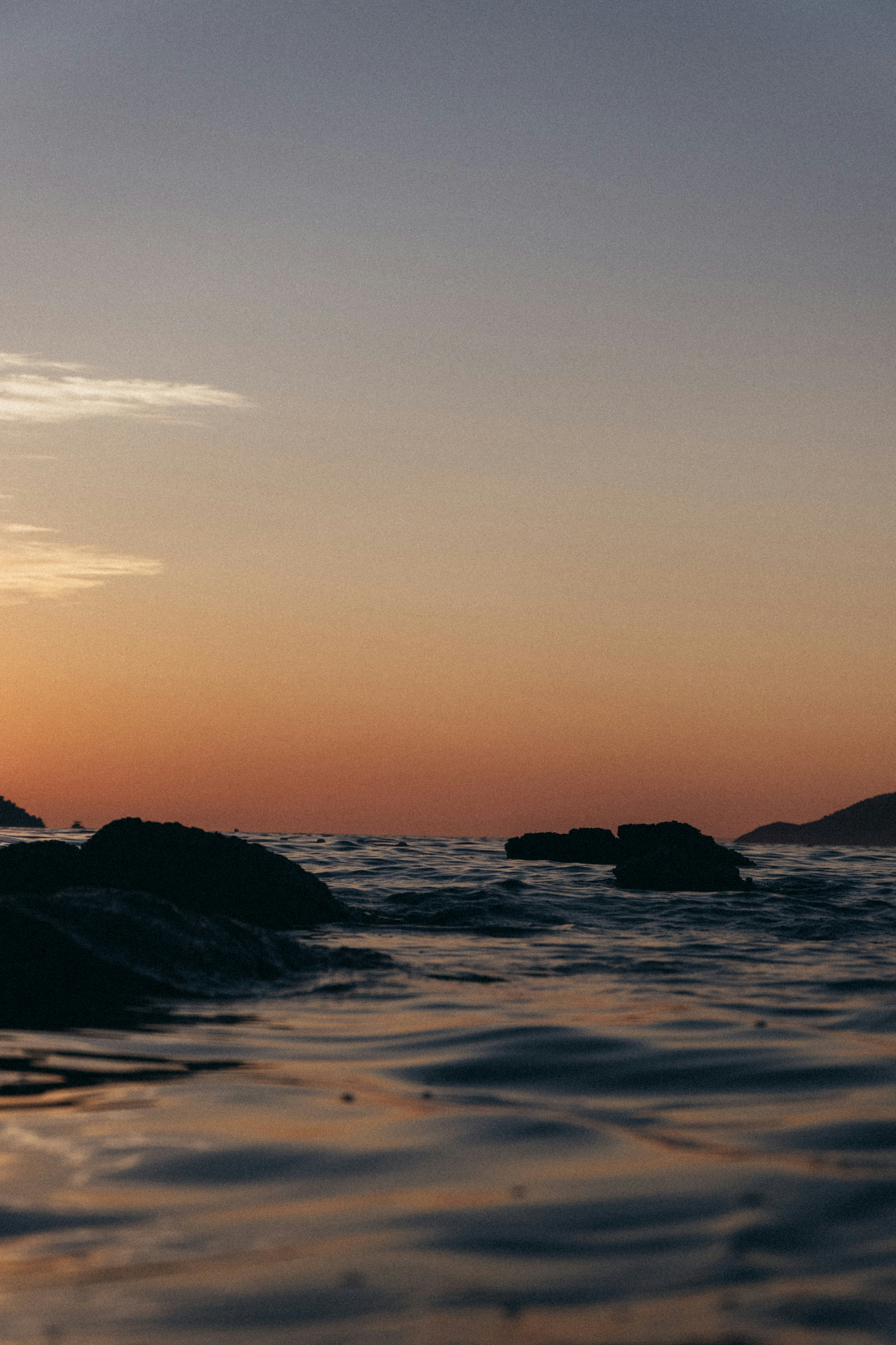 Dusk over Quiet Rocks: Tide’s Golden Edge