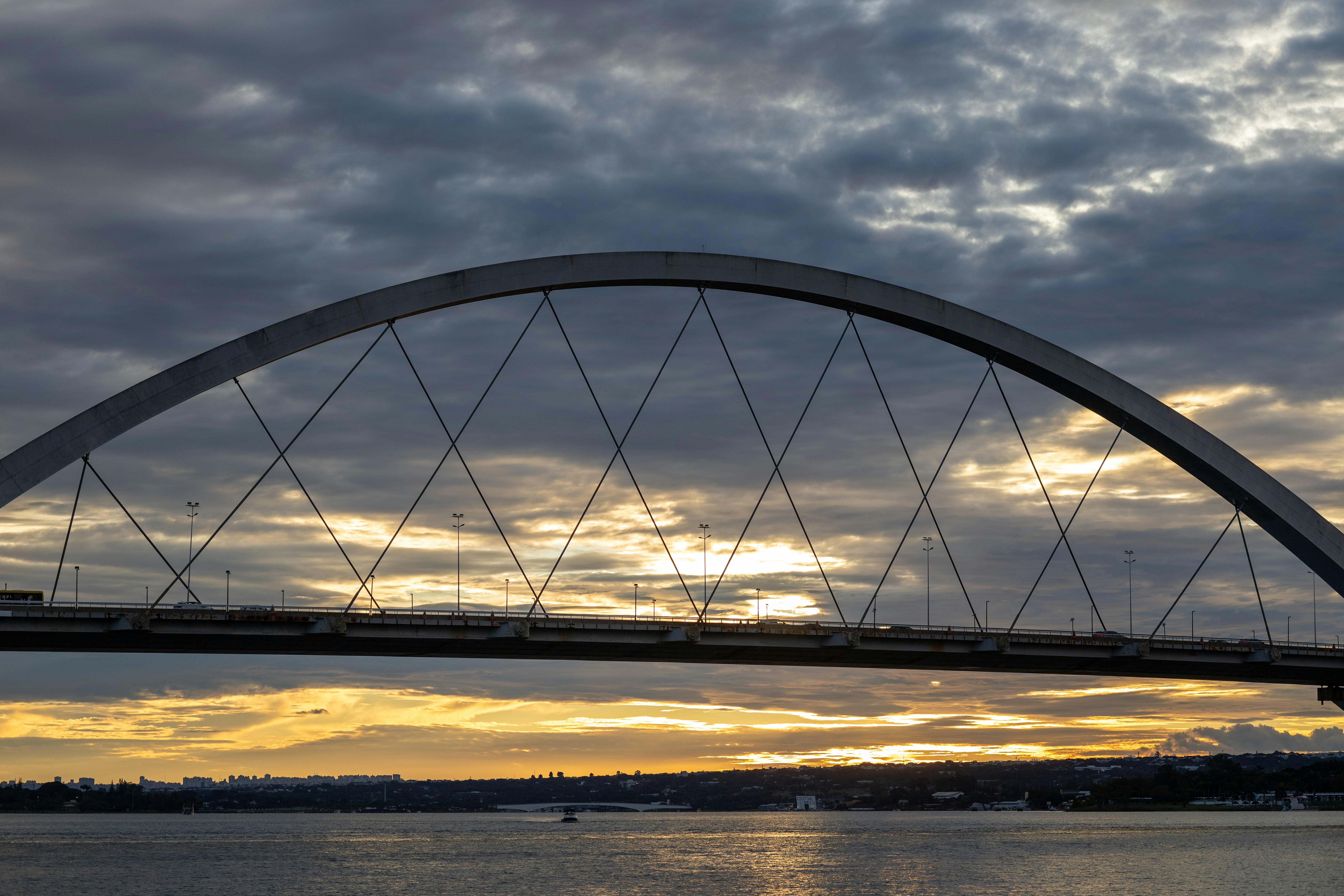 Golden Arc Over the Water: A Sunset Bridge