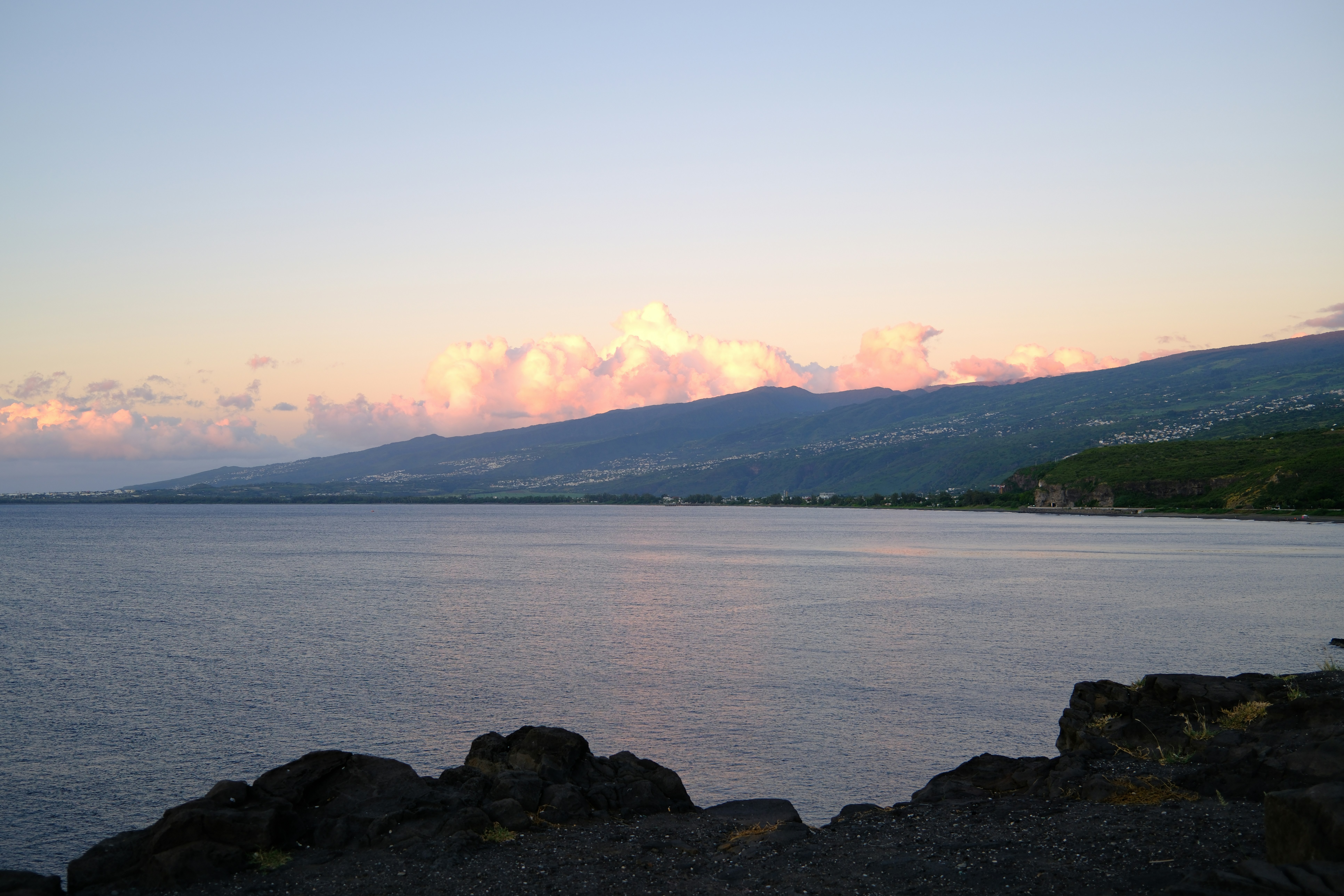 Twin Horizon: Quiet Sea Toward a Sunset Ridge