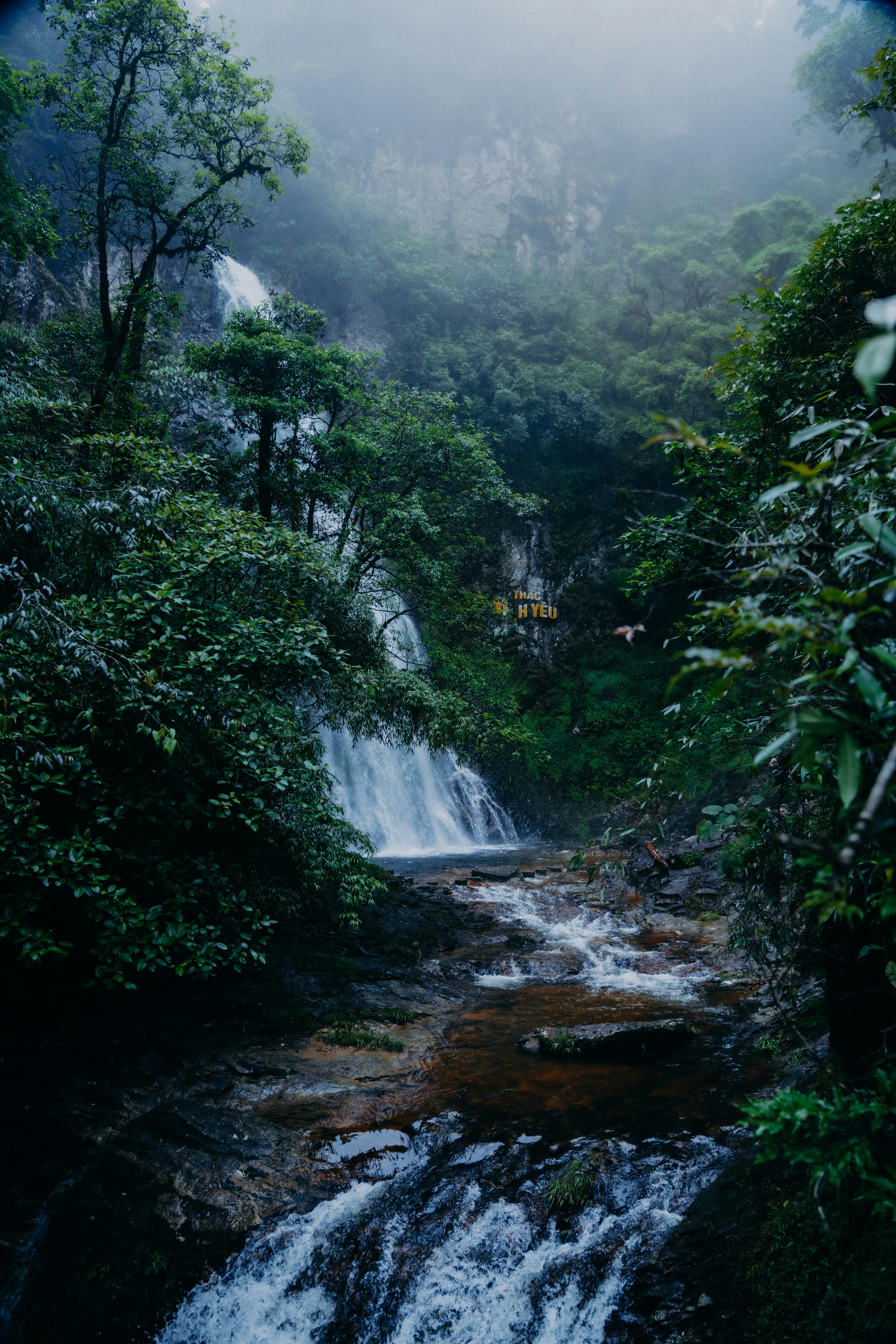 Hidden Falls and Misty Path to the Hotel Sign