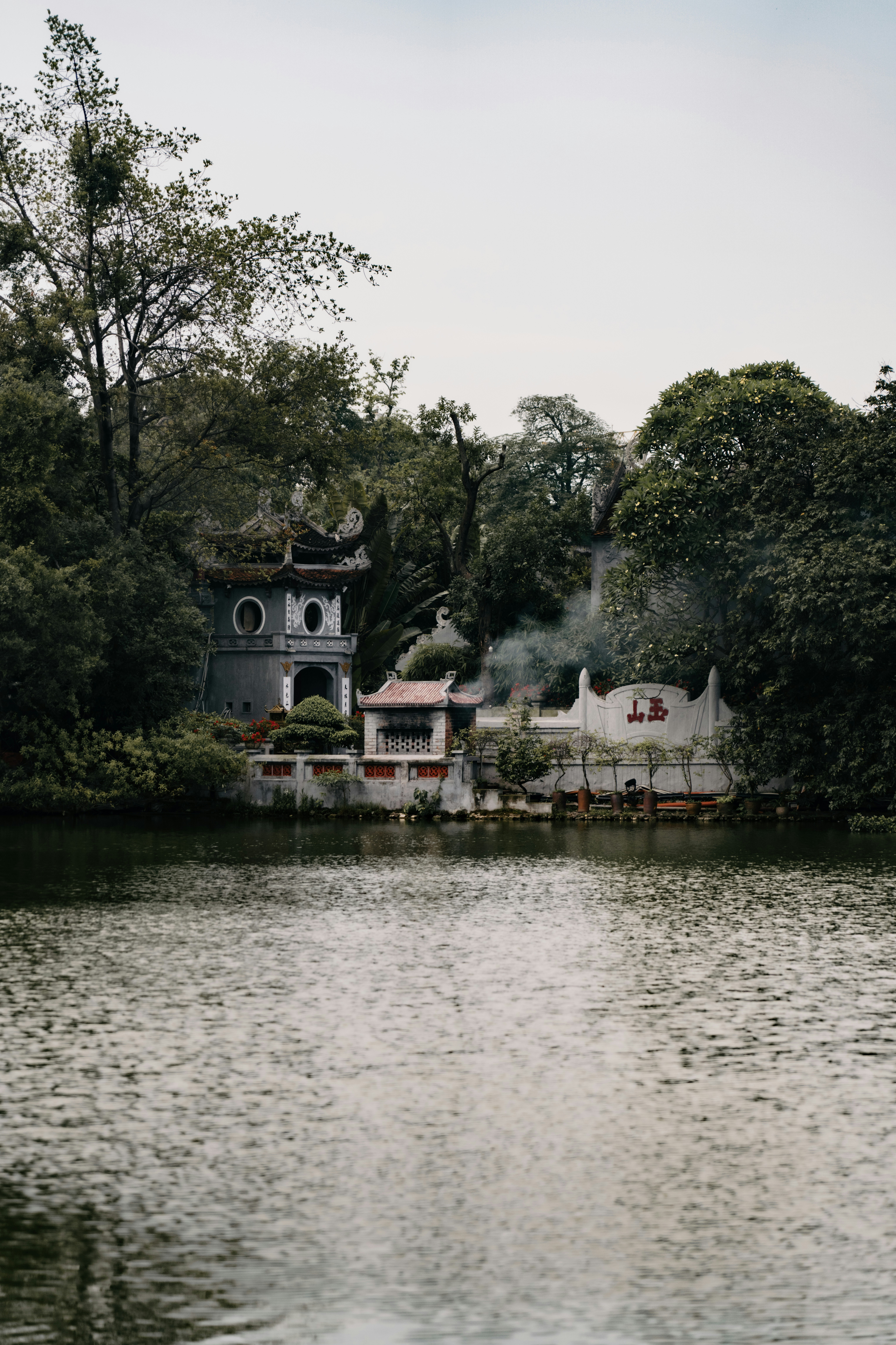 Temple by the Still Lake at Dusk